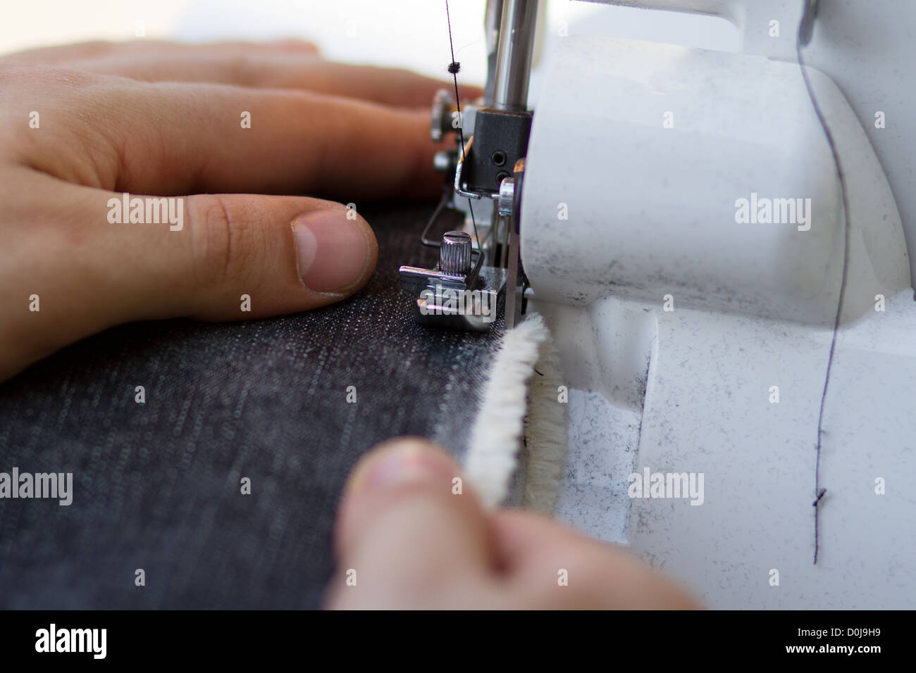 Closeup details of tailors work on a sewing machine. This is how ...