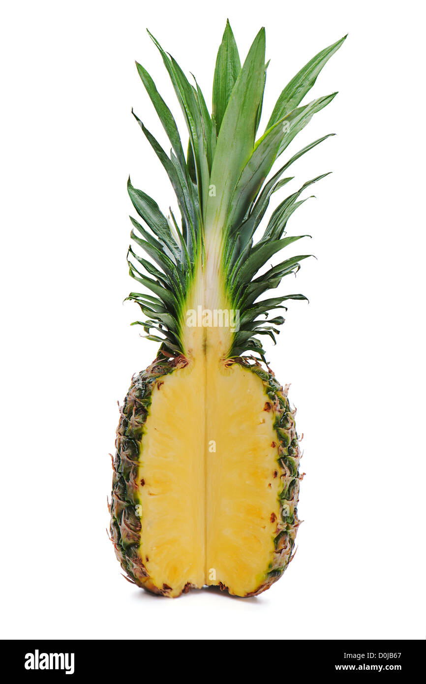 ripe whole pineapple with a quarter cut isolated on white background ...