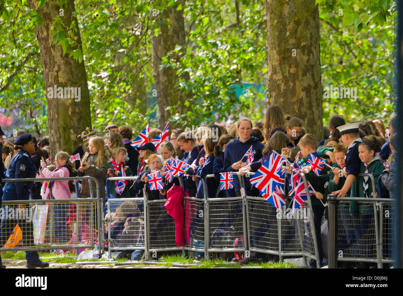 Children waiting to see the Regiments of Guards at the Trooping of the ...