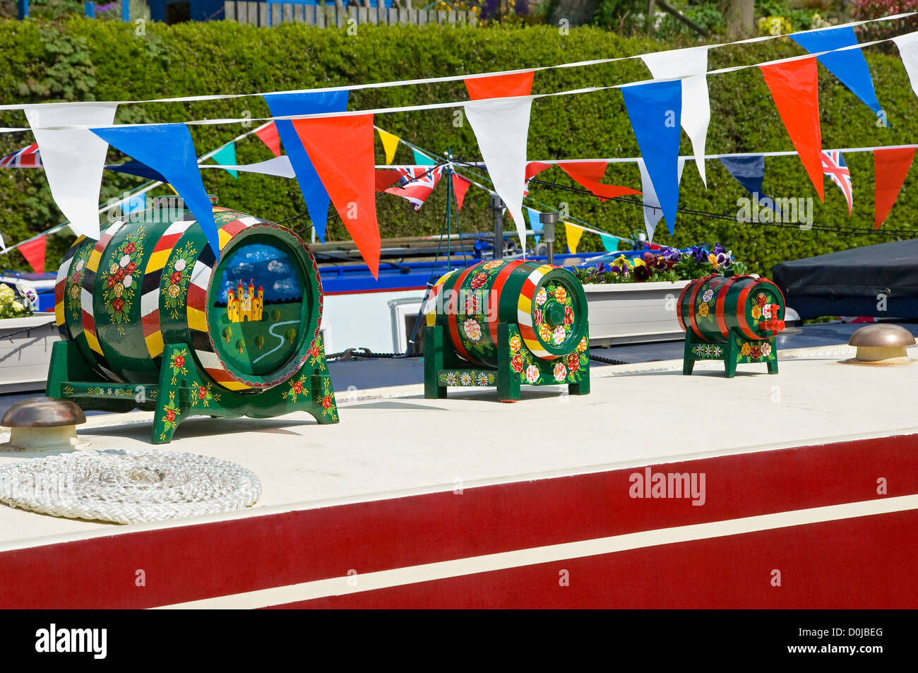Traditional hand-painted barrels on board a narrow boat Stock Photo - Alamy