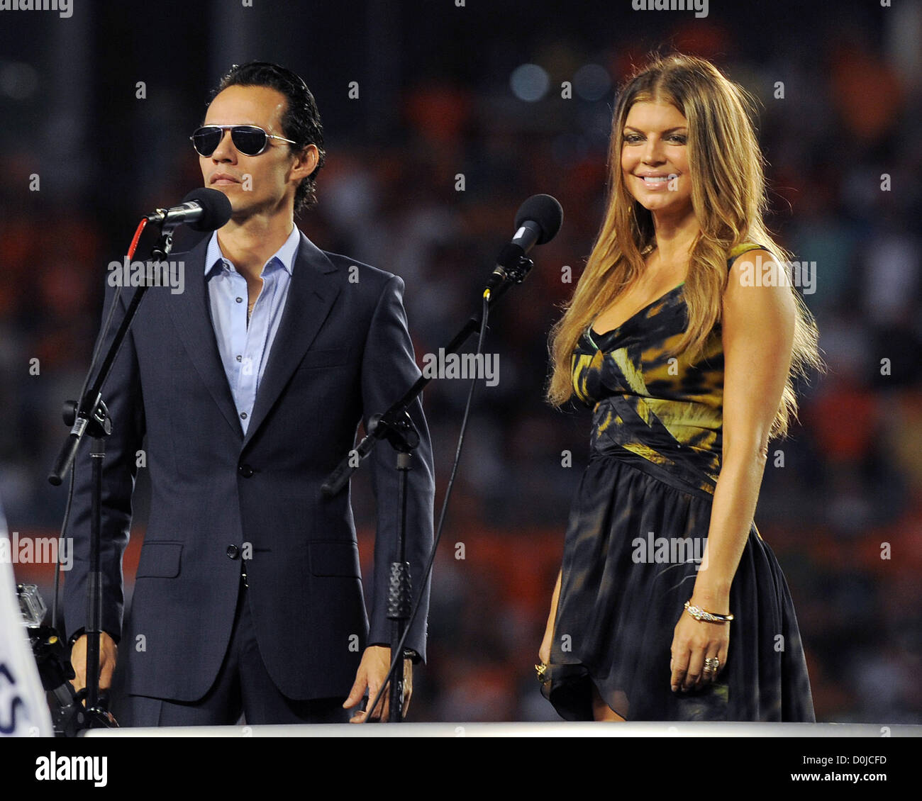 Marc Anthony and Fergie perform the national anthem at the Sun Life ...