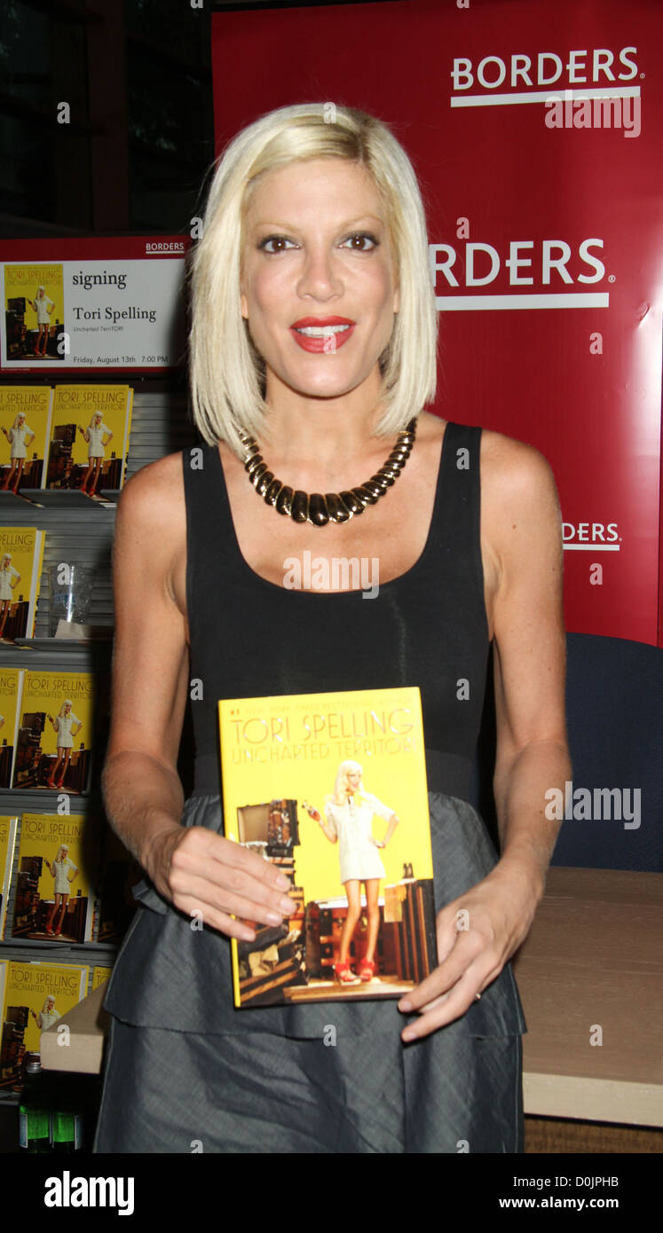 Tori Spelling signs copies of her book 'Uncharted Territori' at Borders ...