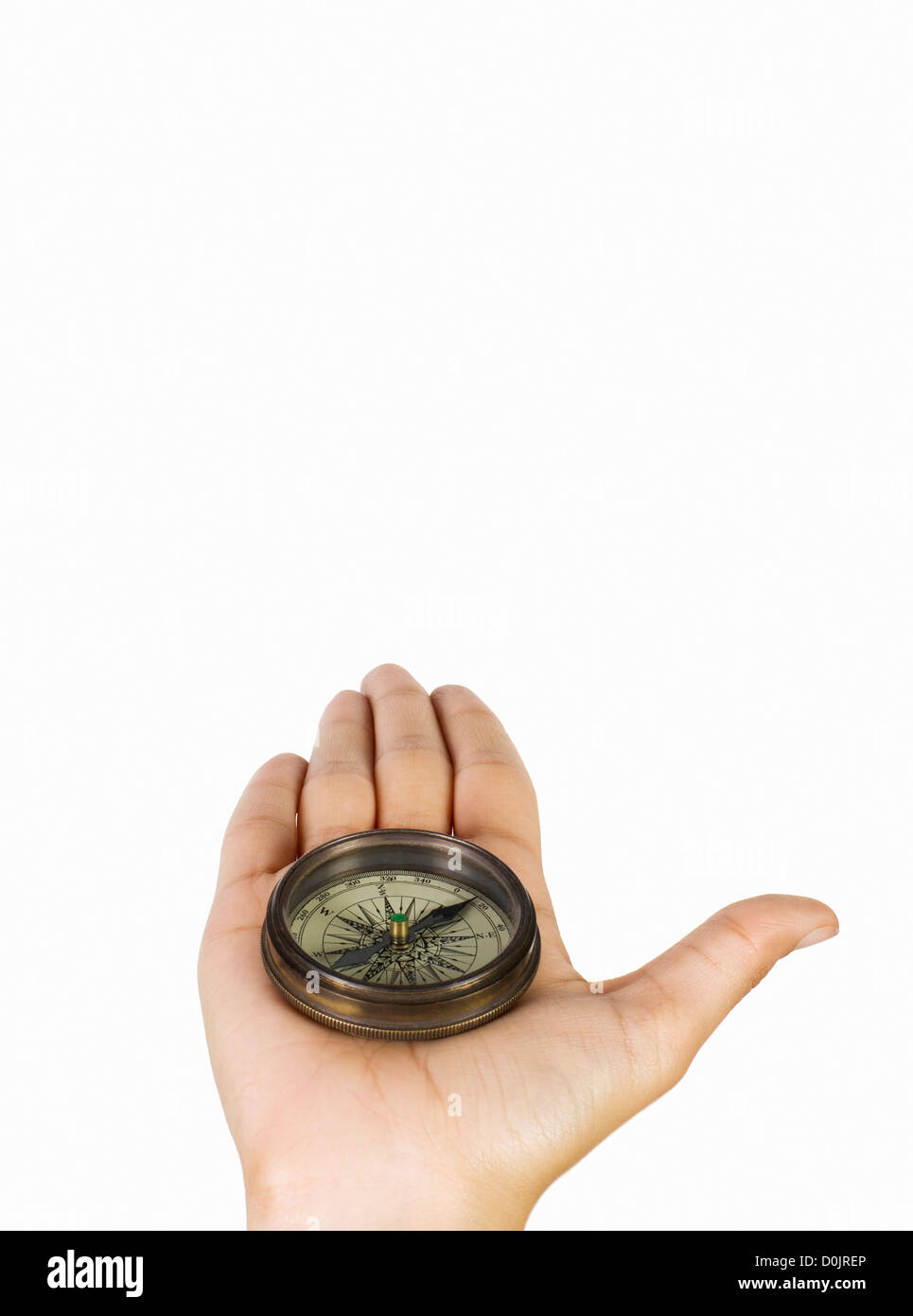 Close-up of a person's hand holding a compass Stock Photo - Alamy