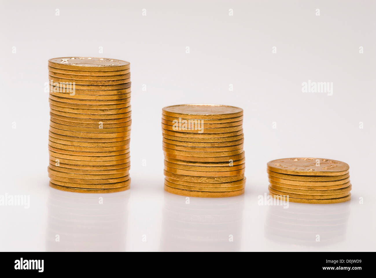 Stacks of gold coins Stock Photo - Alamy
