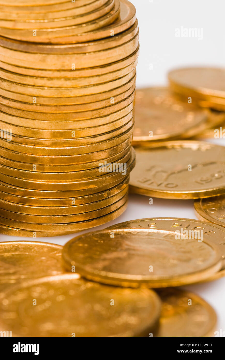 Stack of gold coins Stock Photo - Alamy