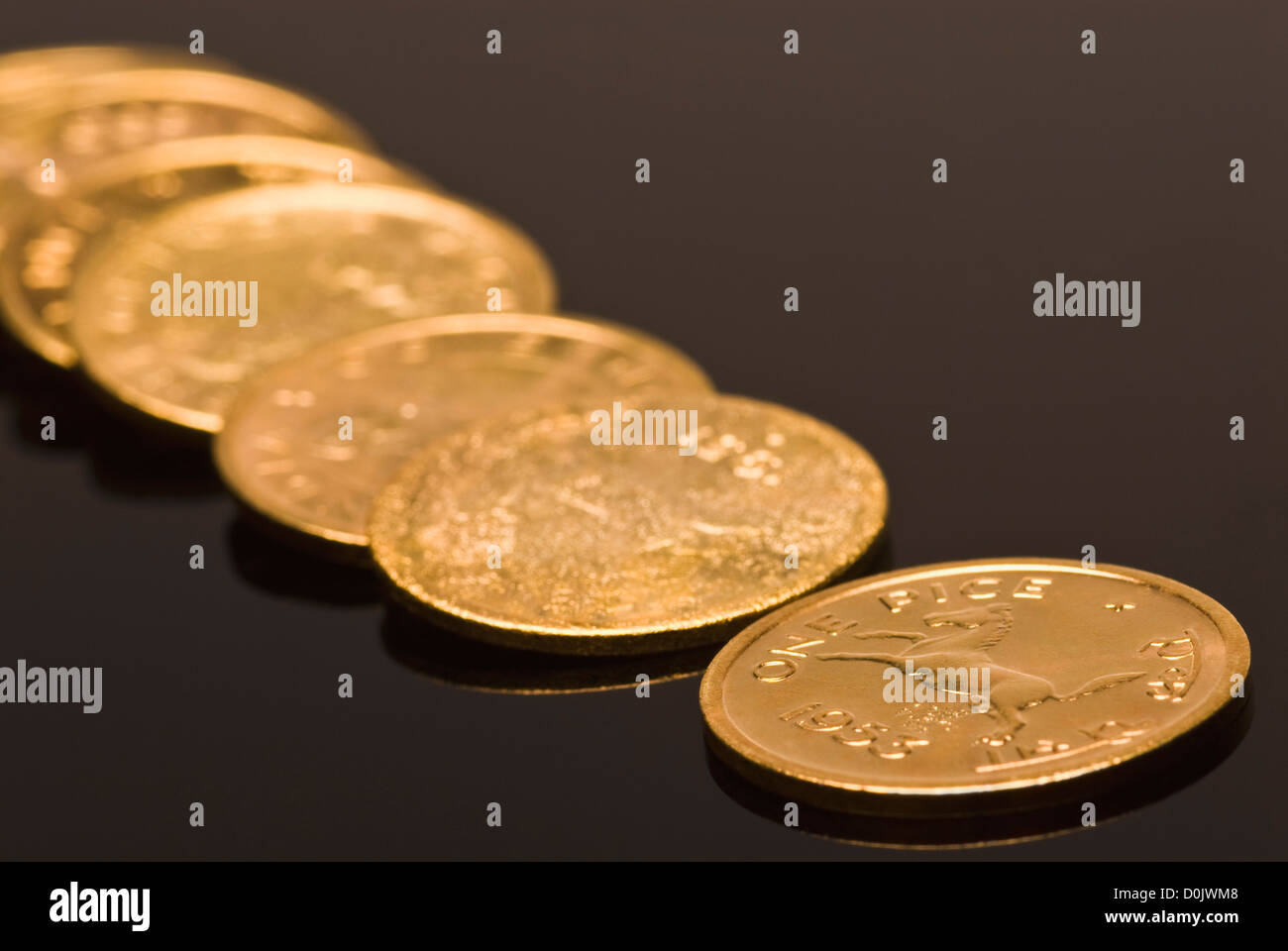 Close-up of gold coins Stock Photo - Alamy
