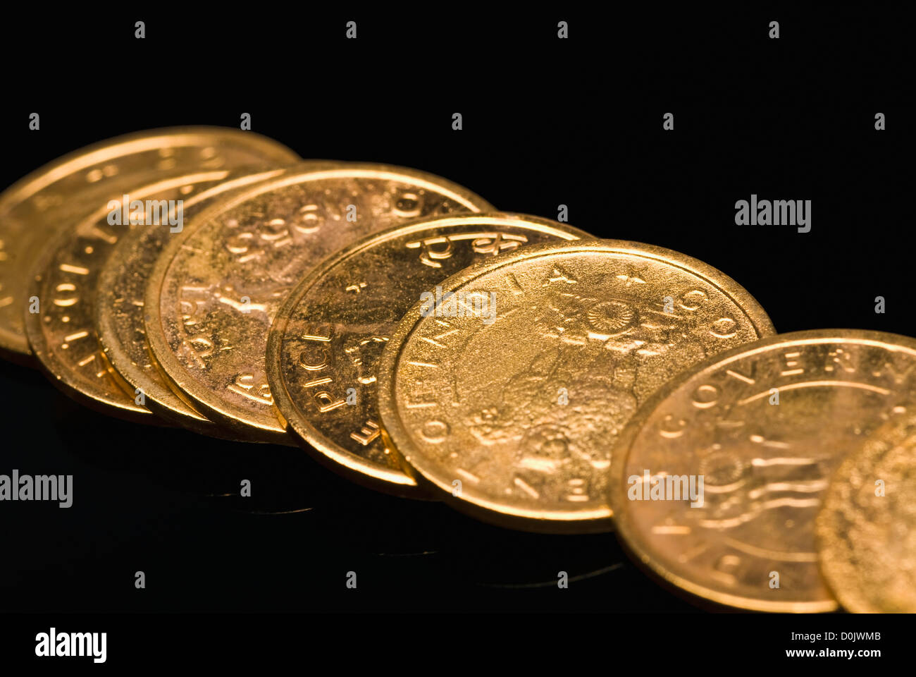 Close-up of gold coins Stock Photo - Alamy