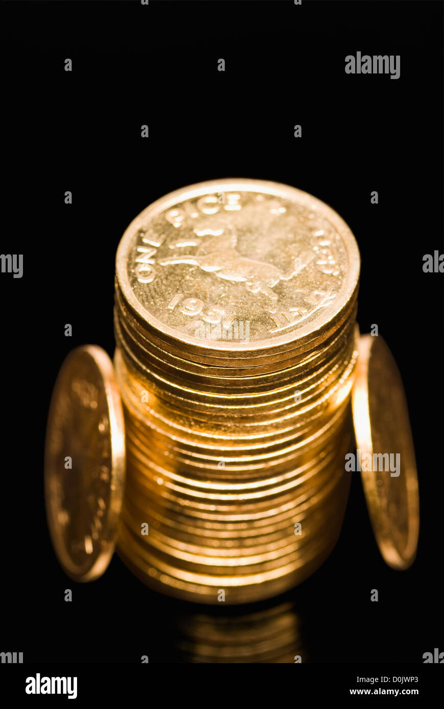 High angle view of a stack of gold coins Stock Photo - Alamy