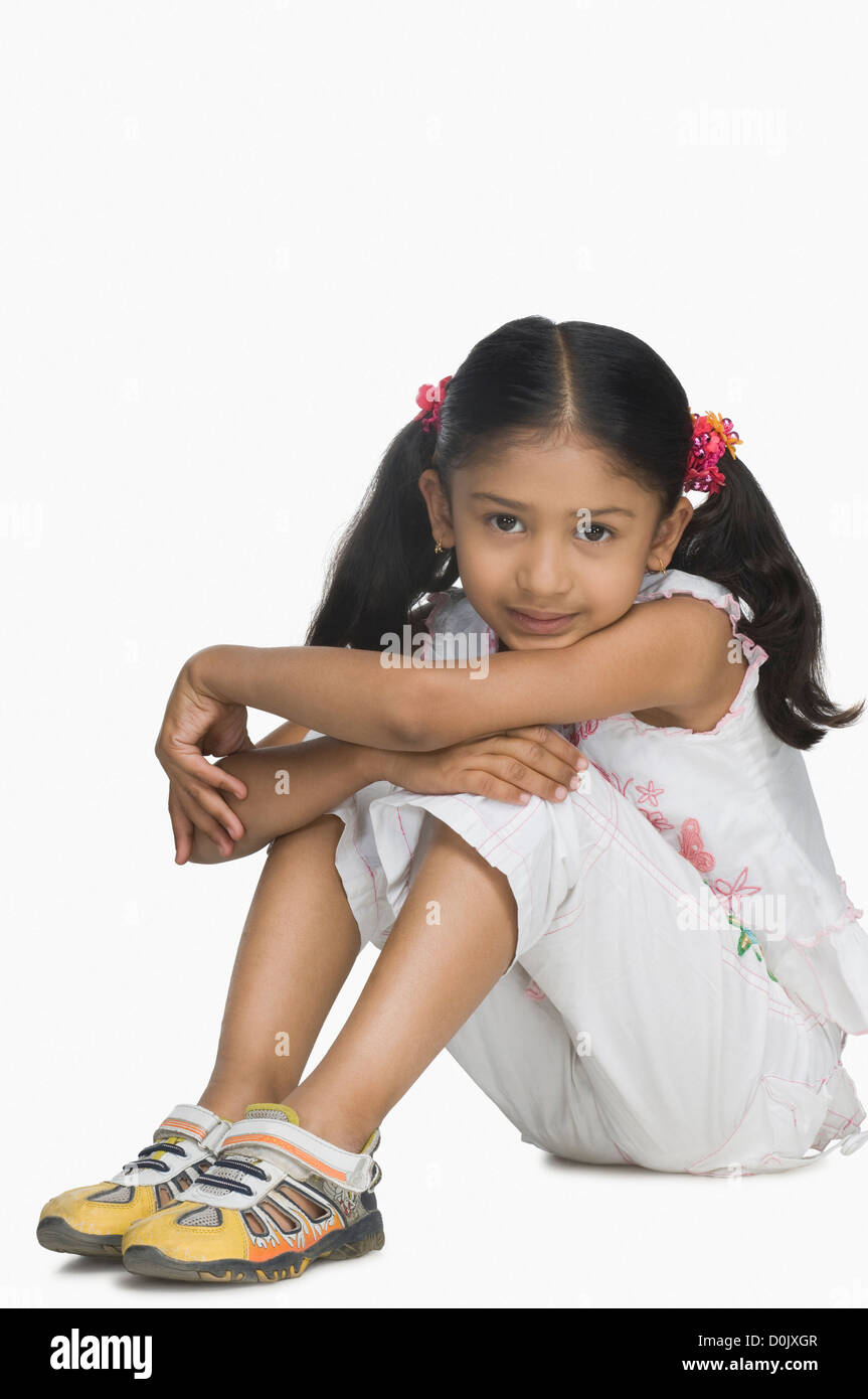 Portrait of a girl smirking Stock Photo - Alamy