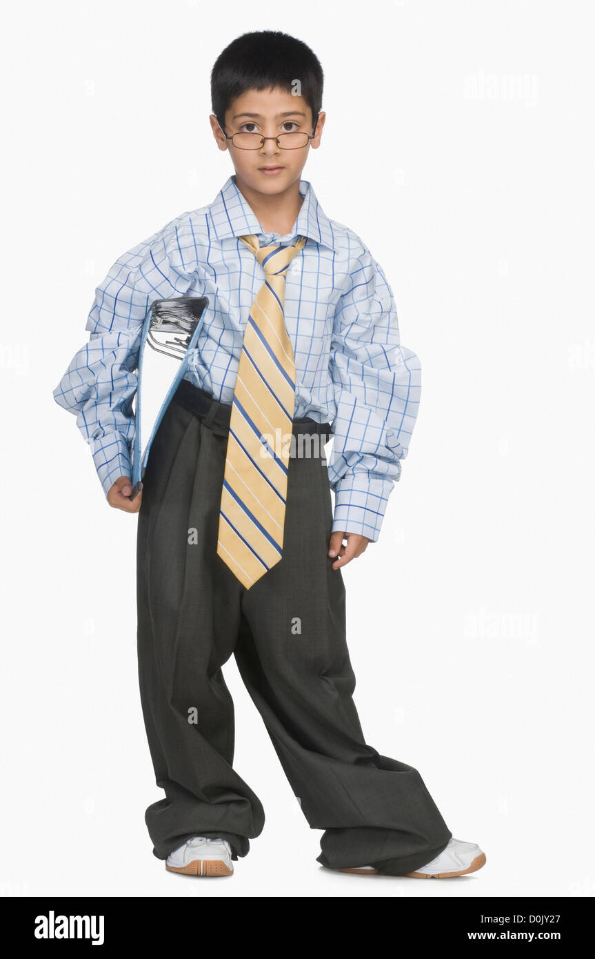 Boy wearing oversized clothes Cut Out Stock Images & Pictures - Alamy