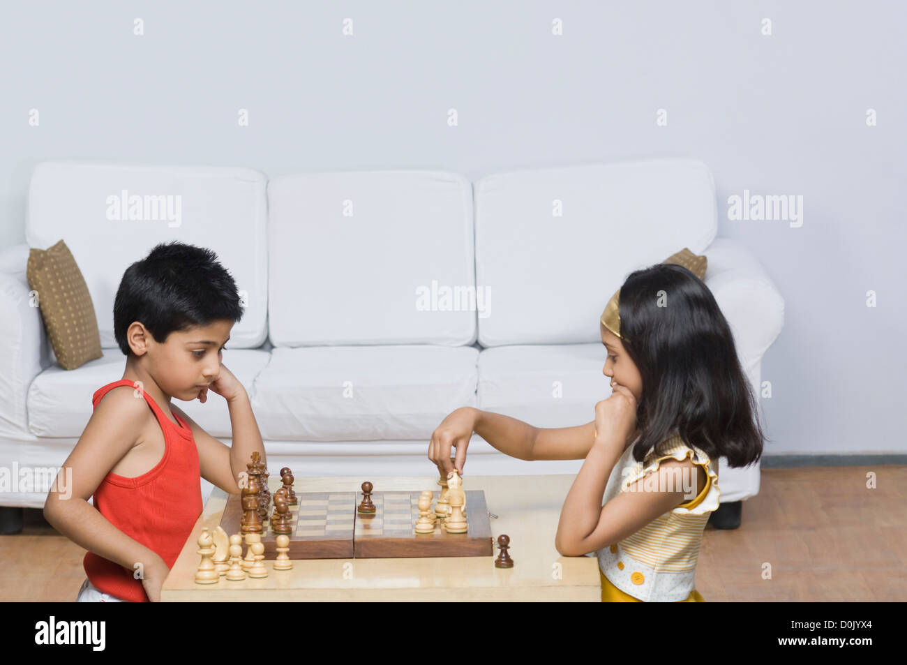 Indian kids playing chess hi-res stock photography and images - Alamy