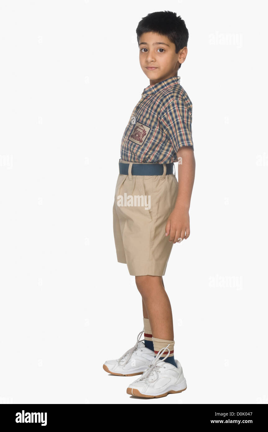 Portrait of a boy standing Stock Photo - Alamy