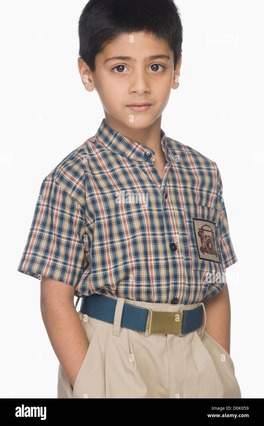 Schoolboy standing hands in pockets hi-res stock photography and images ...