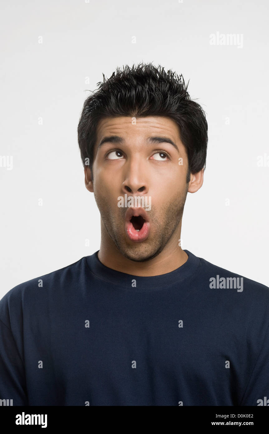 Man with shocked expression Stock Photo - Alamy