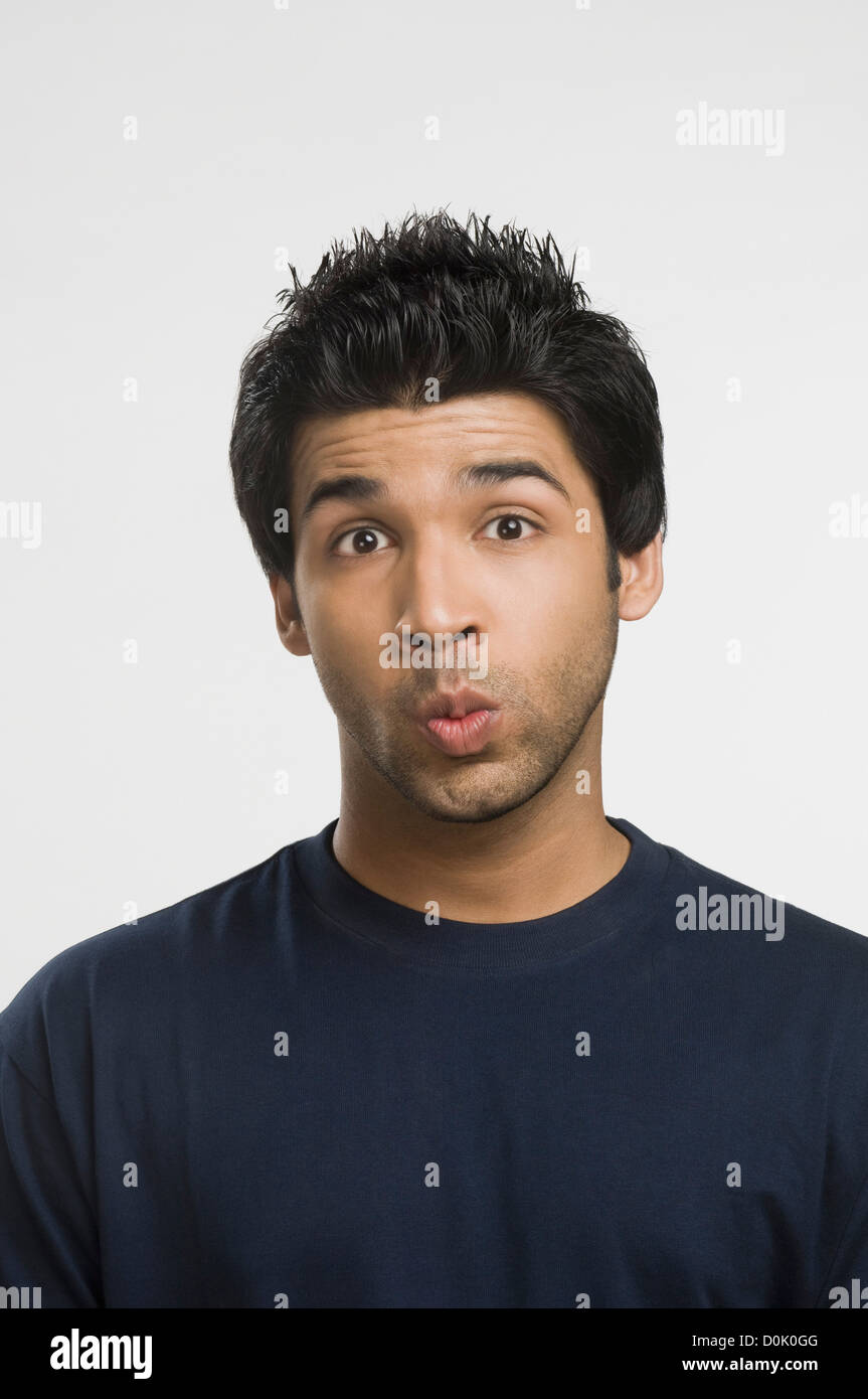 Portrait of a man making a funny face Stock Photo - Alamy