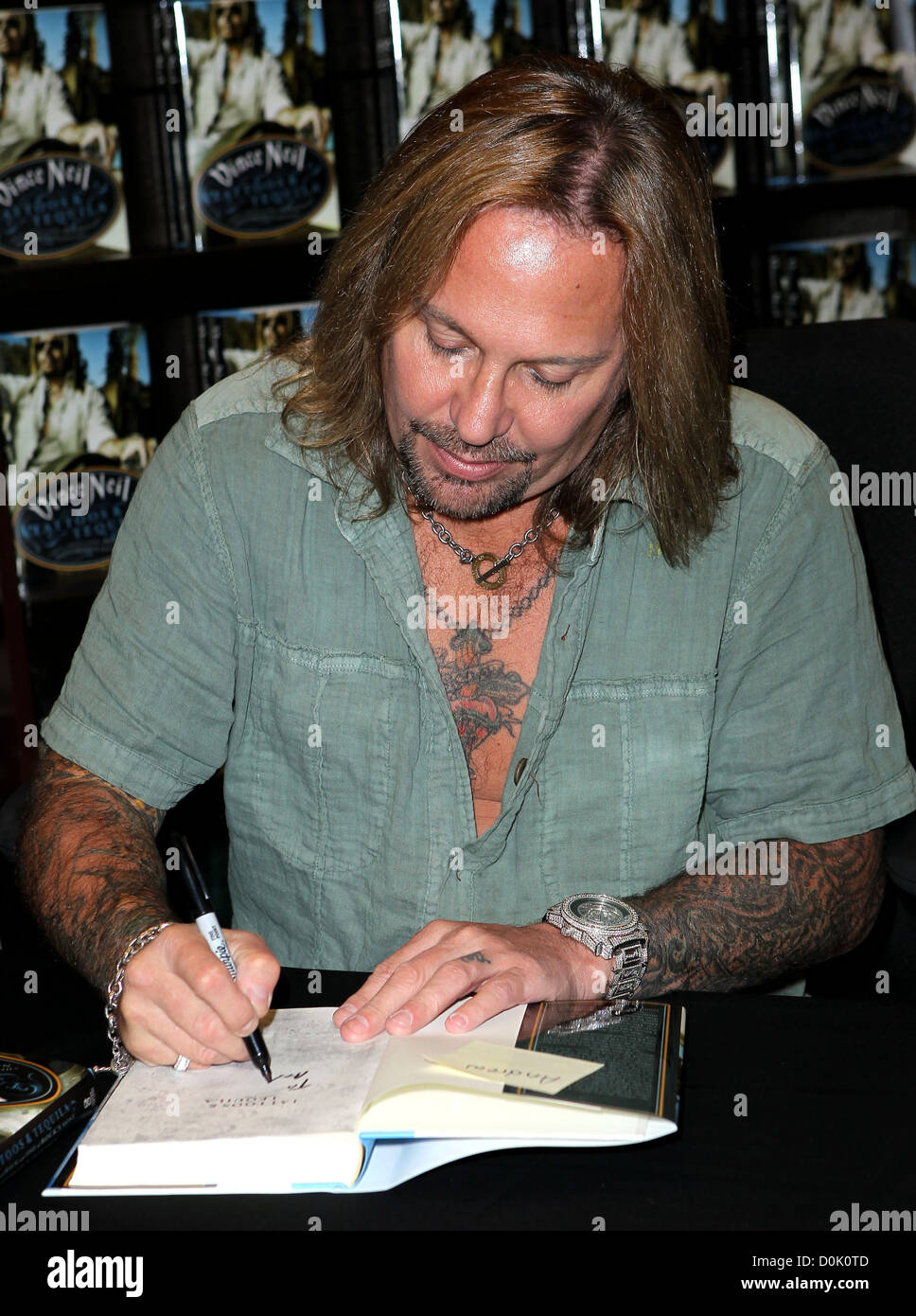 Vince Neil signs copies of his new book 'Tattoos & Tequila' at Barnes ...
