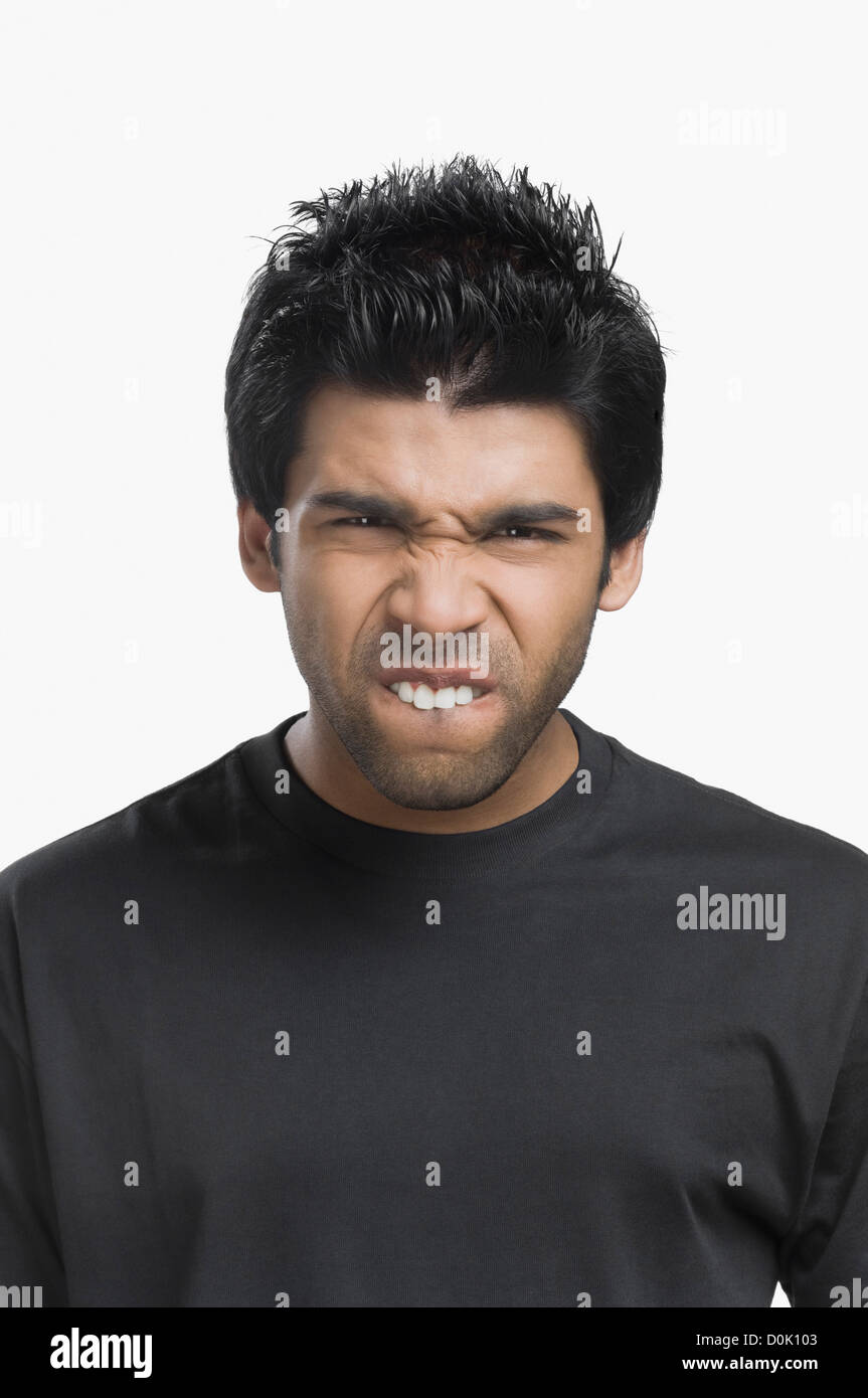 Close-up of a man looking angry Stock Photo - Alamy