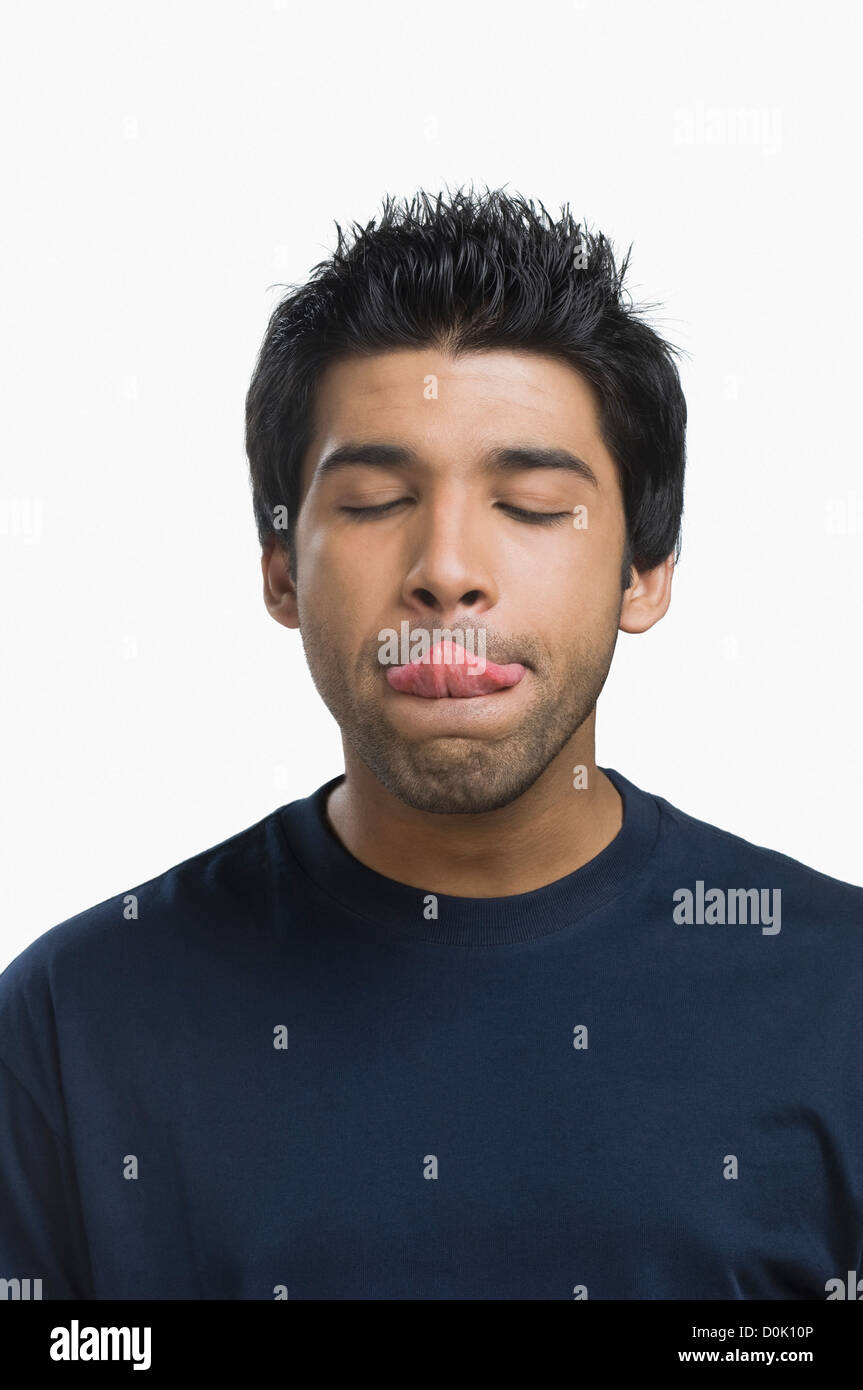 Close up of a man licking his lips hi-res stock photography and images ...