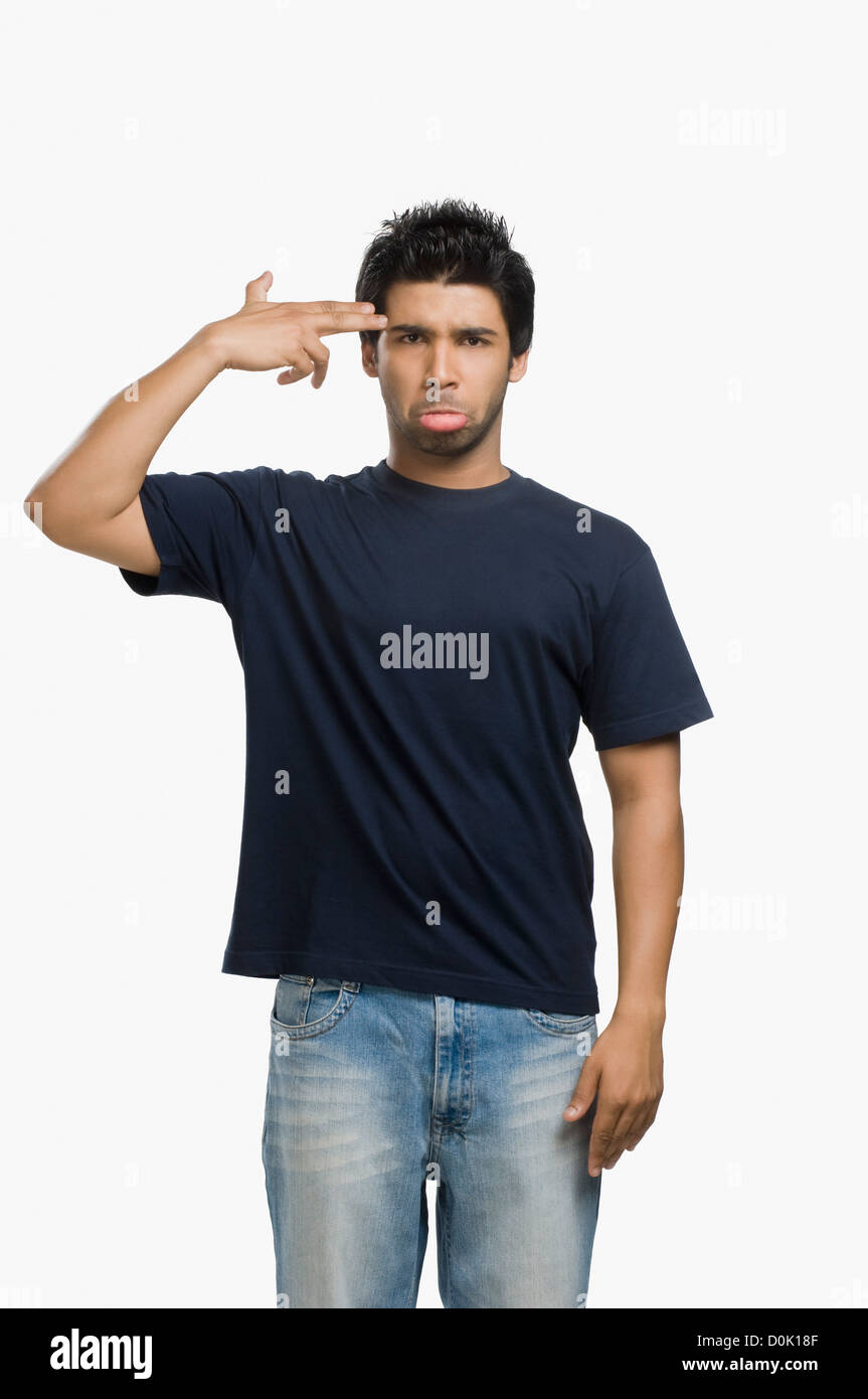 Man making finger gun gesture hi-res stock photography and images - Alamy