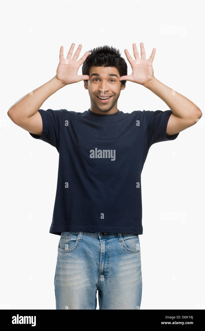 Man making a funny face and teasing Stock Photo - Alamy