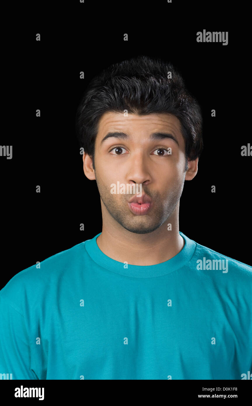 Man puckering lips hi-res stock photography and images - Alamy