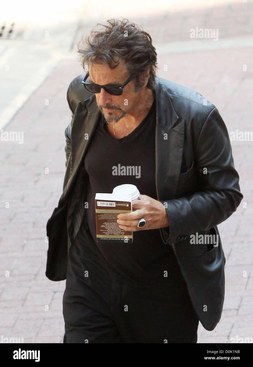 Al Pacino, dressed in all black, was seen heading into a building a ...