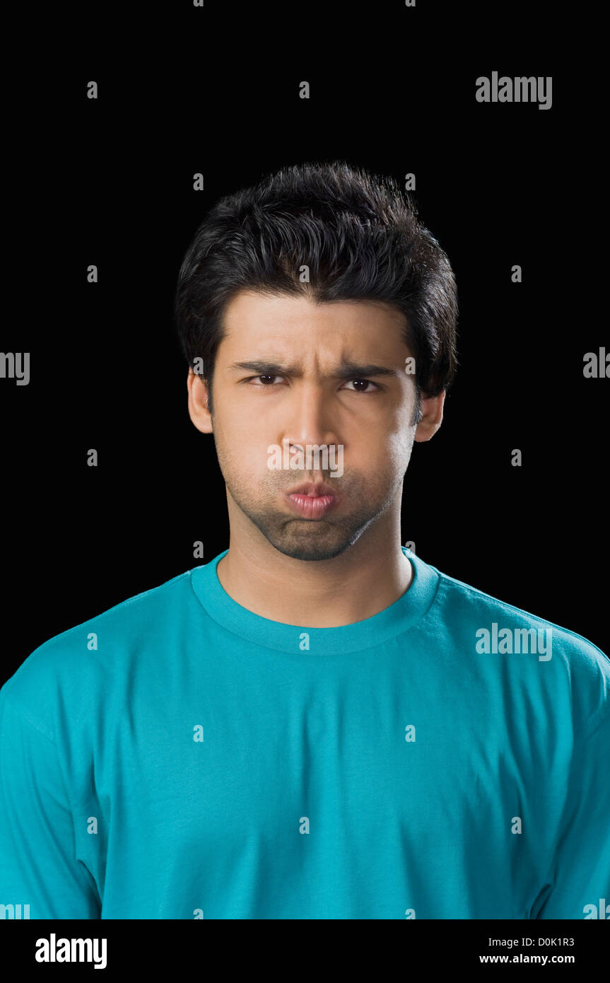 Puffed up cheeks hi-res stock photography and images - Alamy