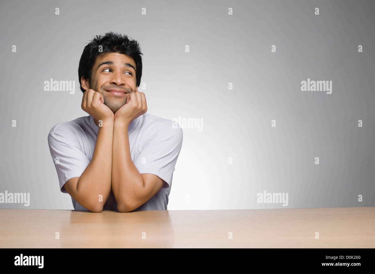 Happy man looking sideways Stock Photo - Alamy Happy man looking sideways Stock Photo - Alamy
