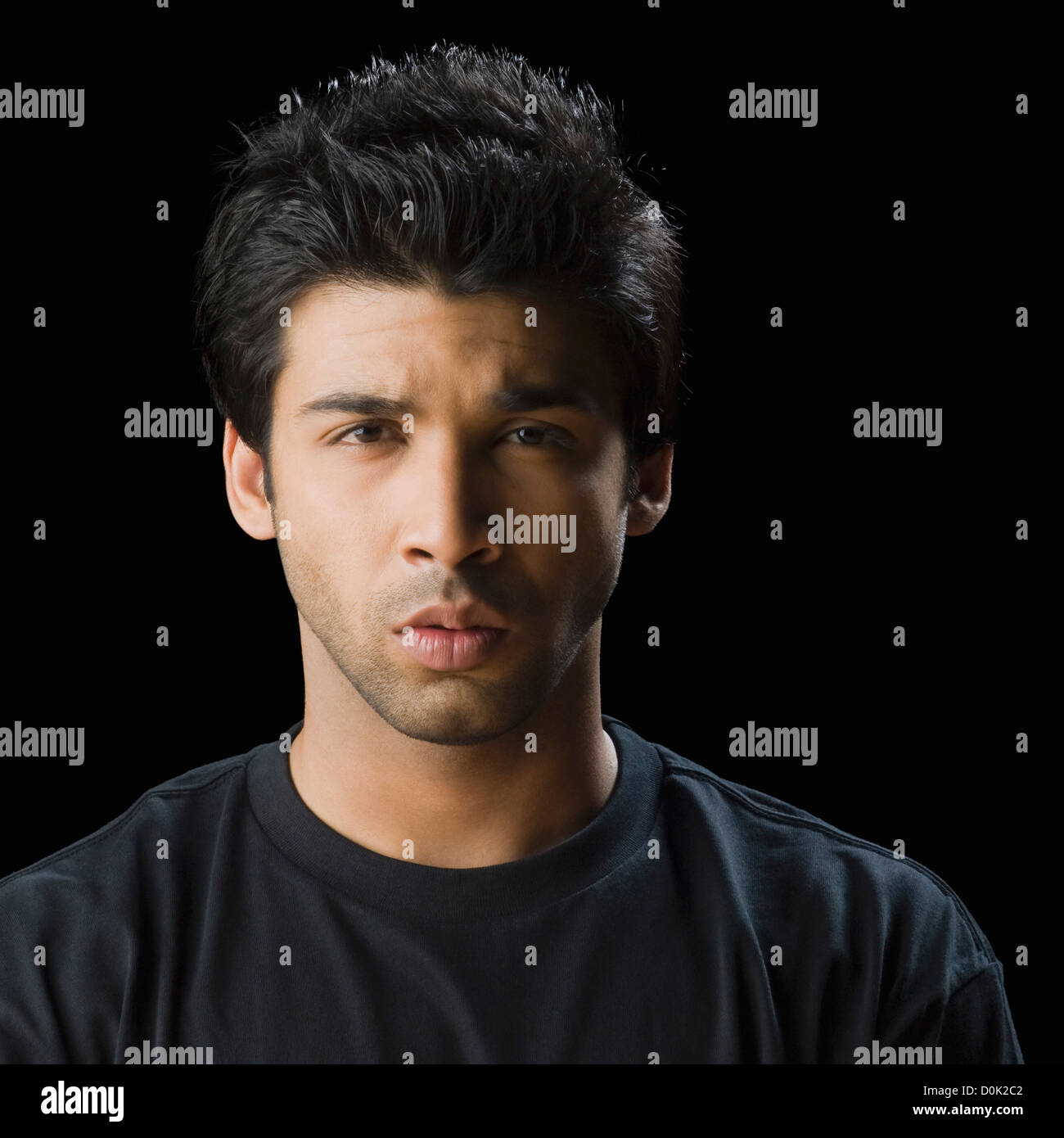 Portrait of a man looking sad Stock Photo - Alamy