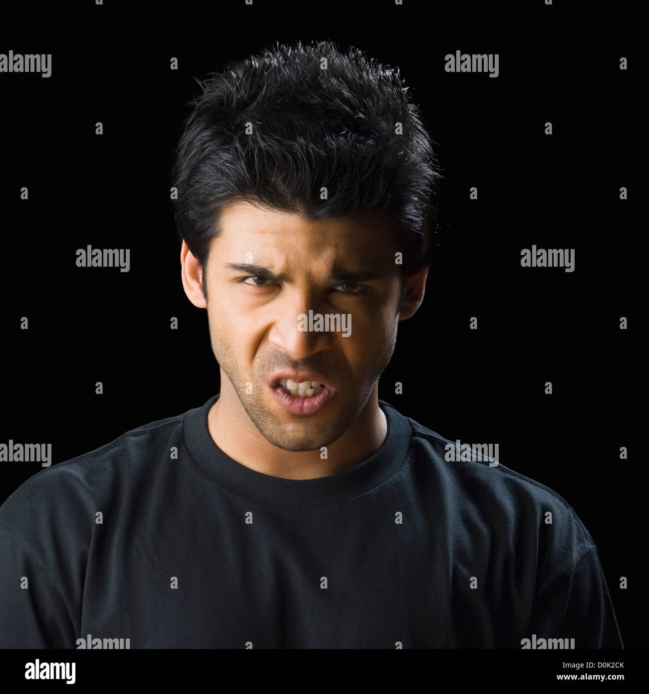 Close-up of a man looking angry Stock Photo - Alamy