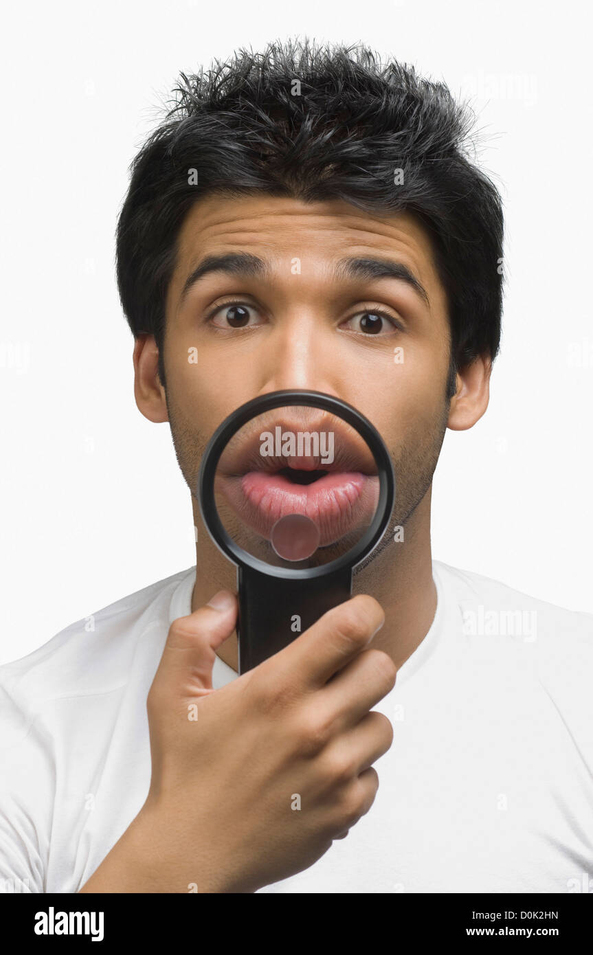 Lips in magnifying glass hi-res stock photography and images - Alamy