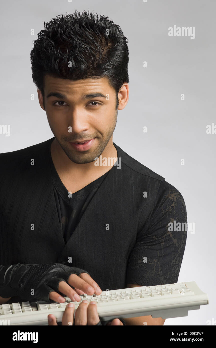 Black glove typing hi-res stock photography and images - Alamy