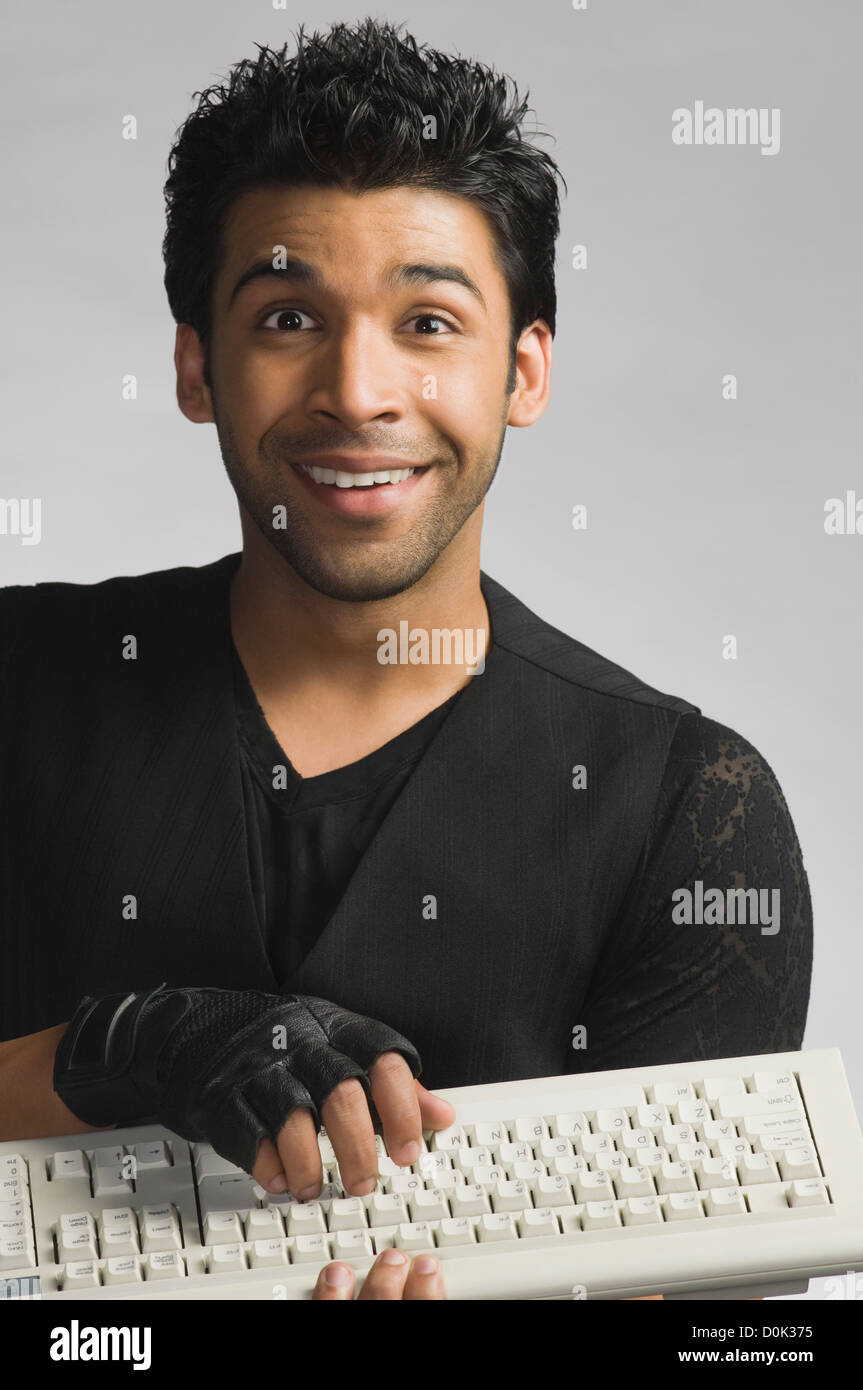 Black glove typing hi-res stock photography and images - Alamy
