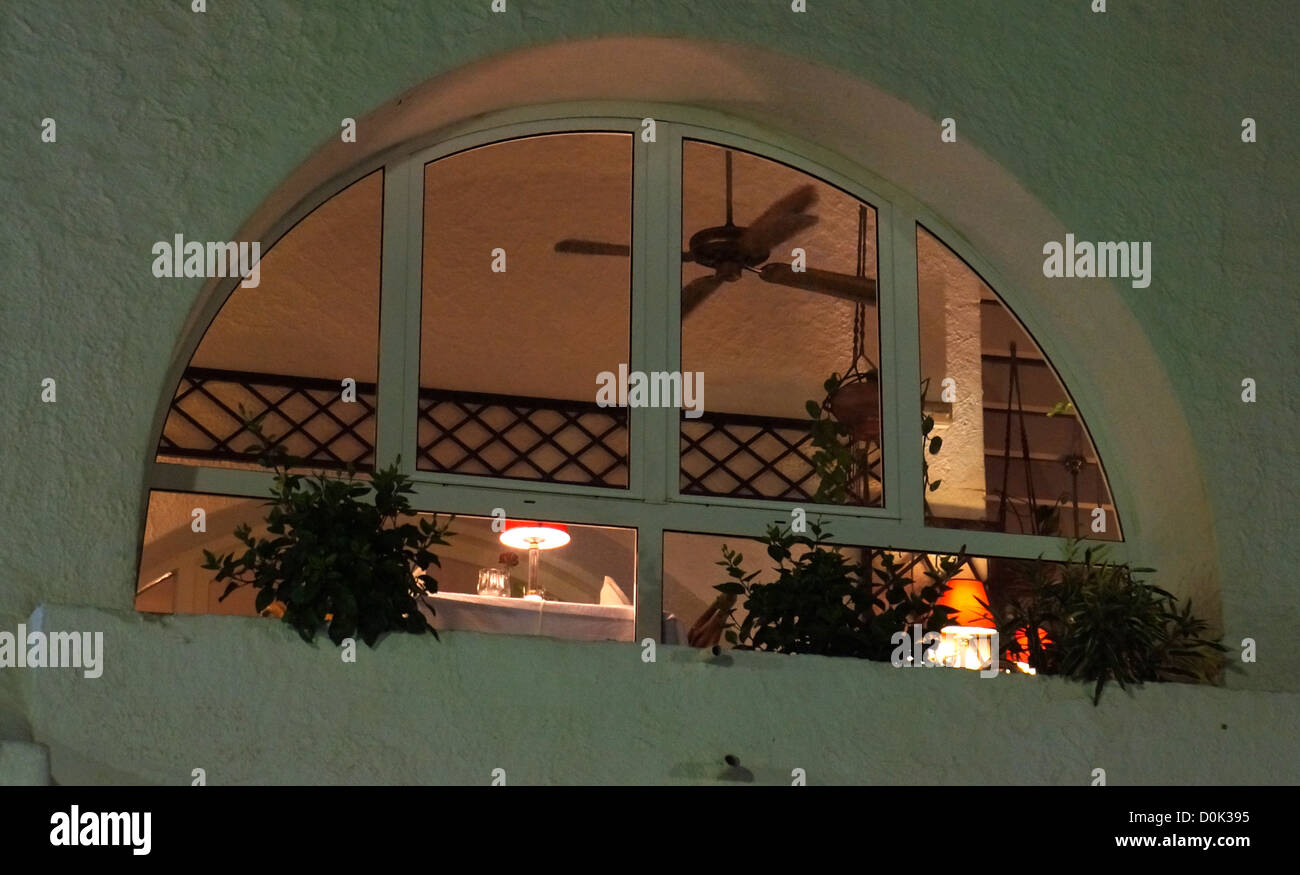 Old-fashioned panoramic restaurant seen from outside trough a big ...