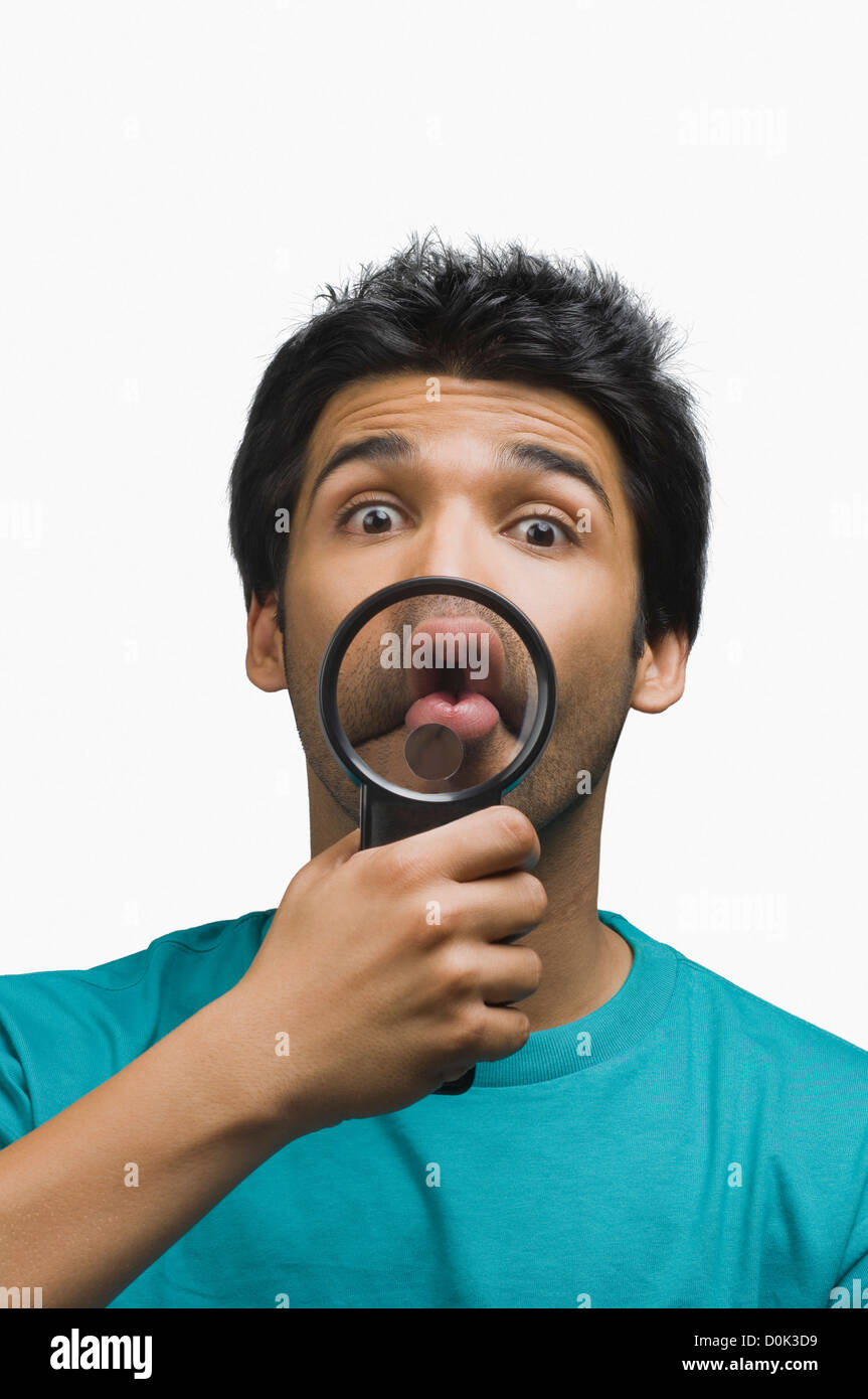 Lips in magnifying glass hi-res stock photography and images - Alamy