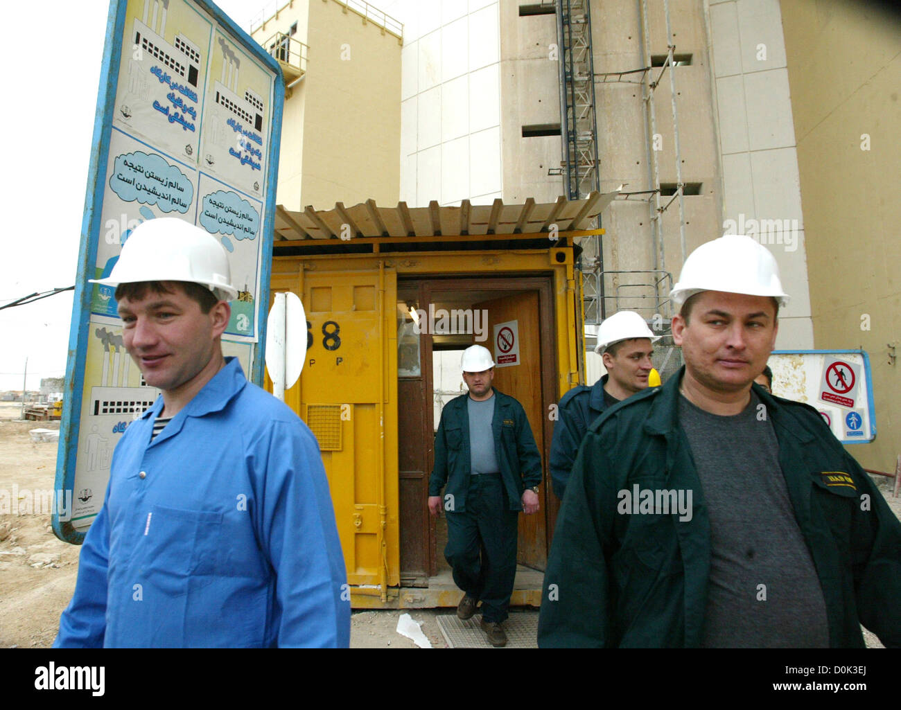 Russian and Iranian workers and engineers constructing Nuclear Power ...