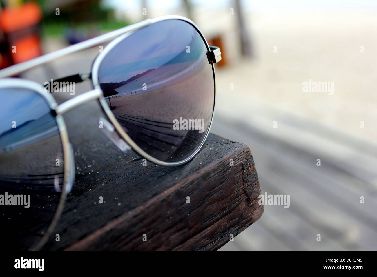 A view of the beach in the reflection of sunglasses Stock Photo - Alamy
