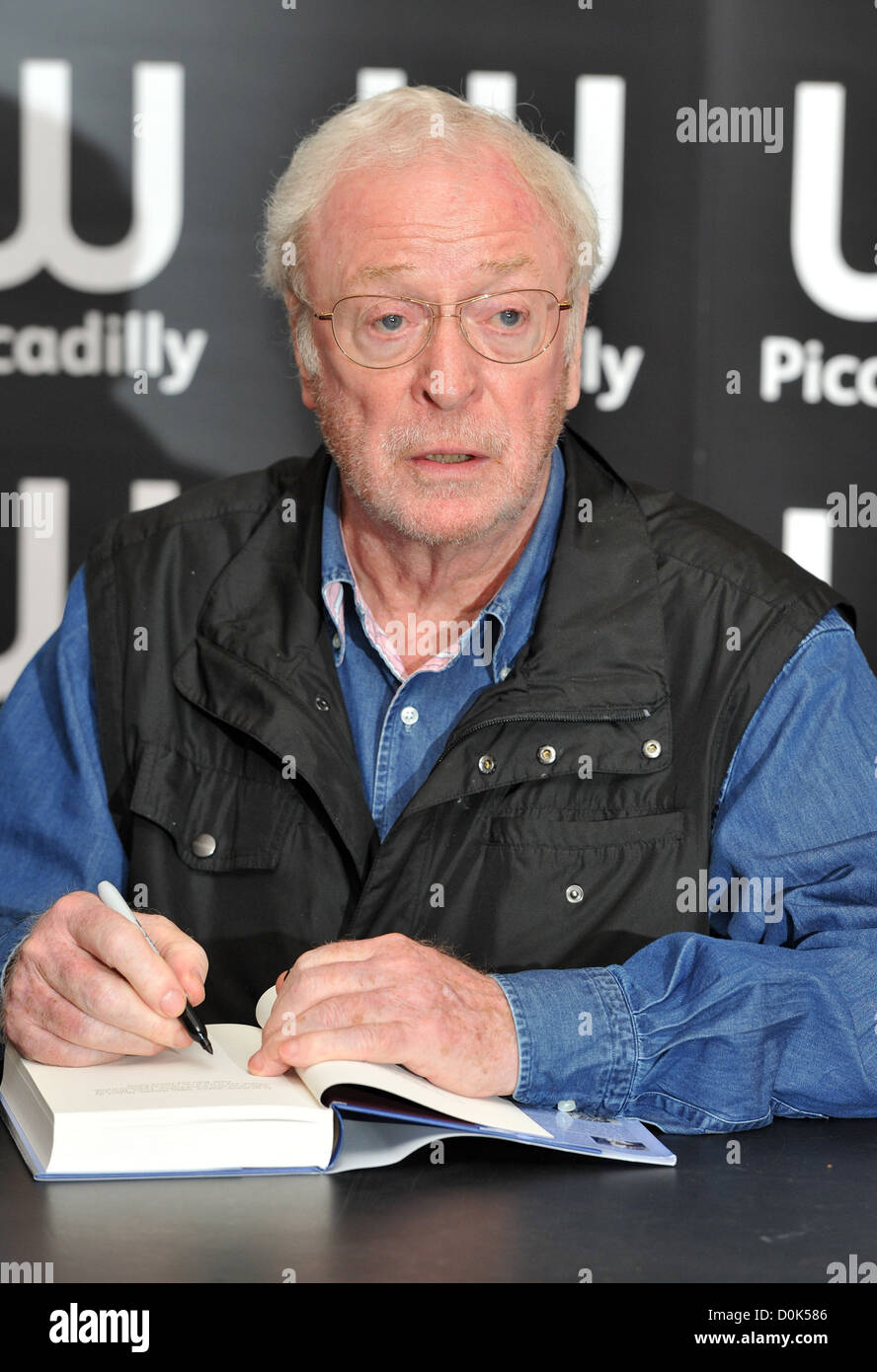 Sir Michael Caine signing copies of his autobiography 'The Elephant to ...