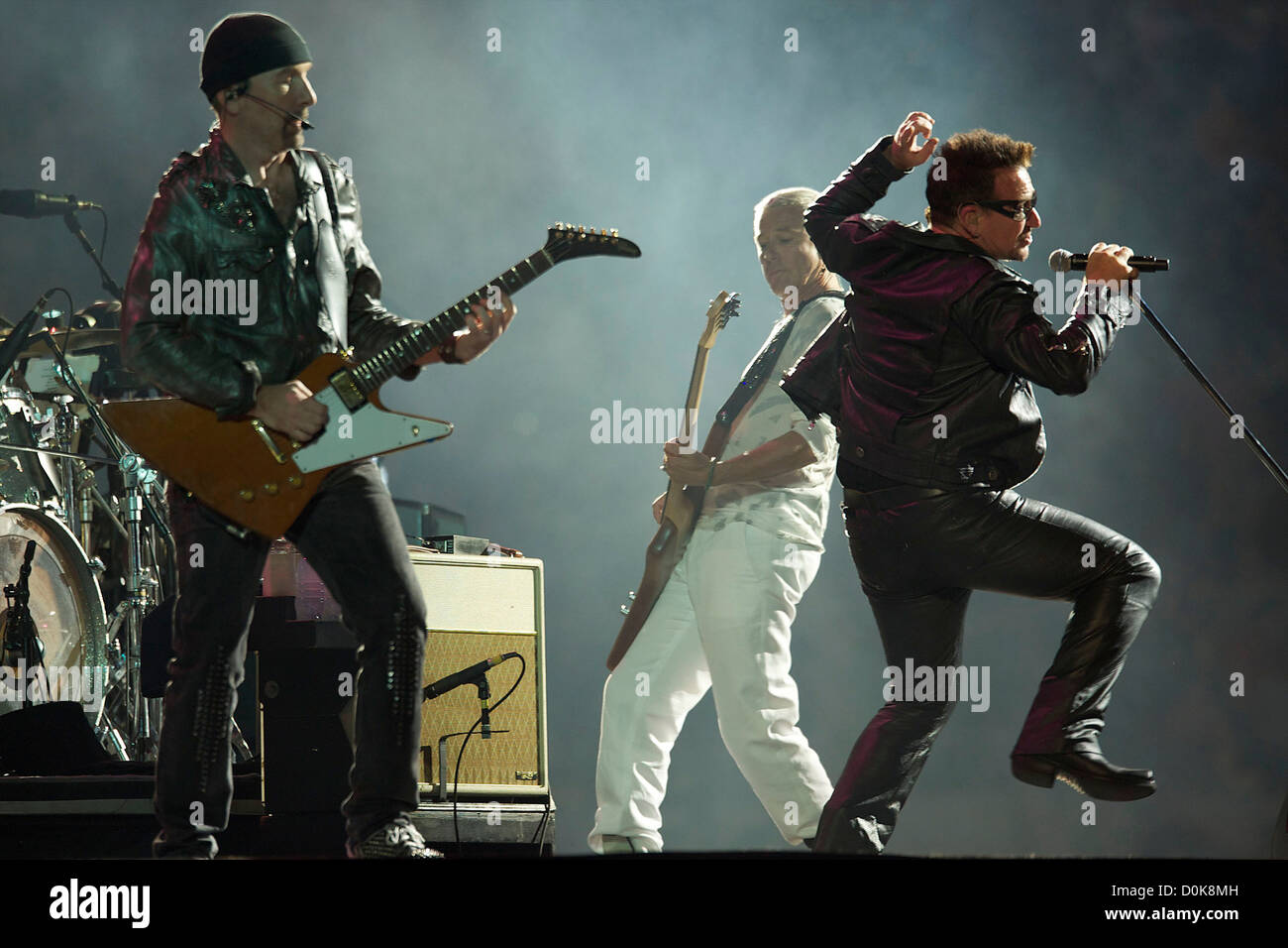 The Edge, Bono and Adam CLayton of rock band U2 performs on stage ...