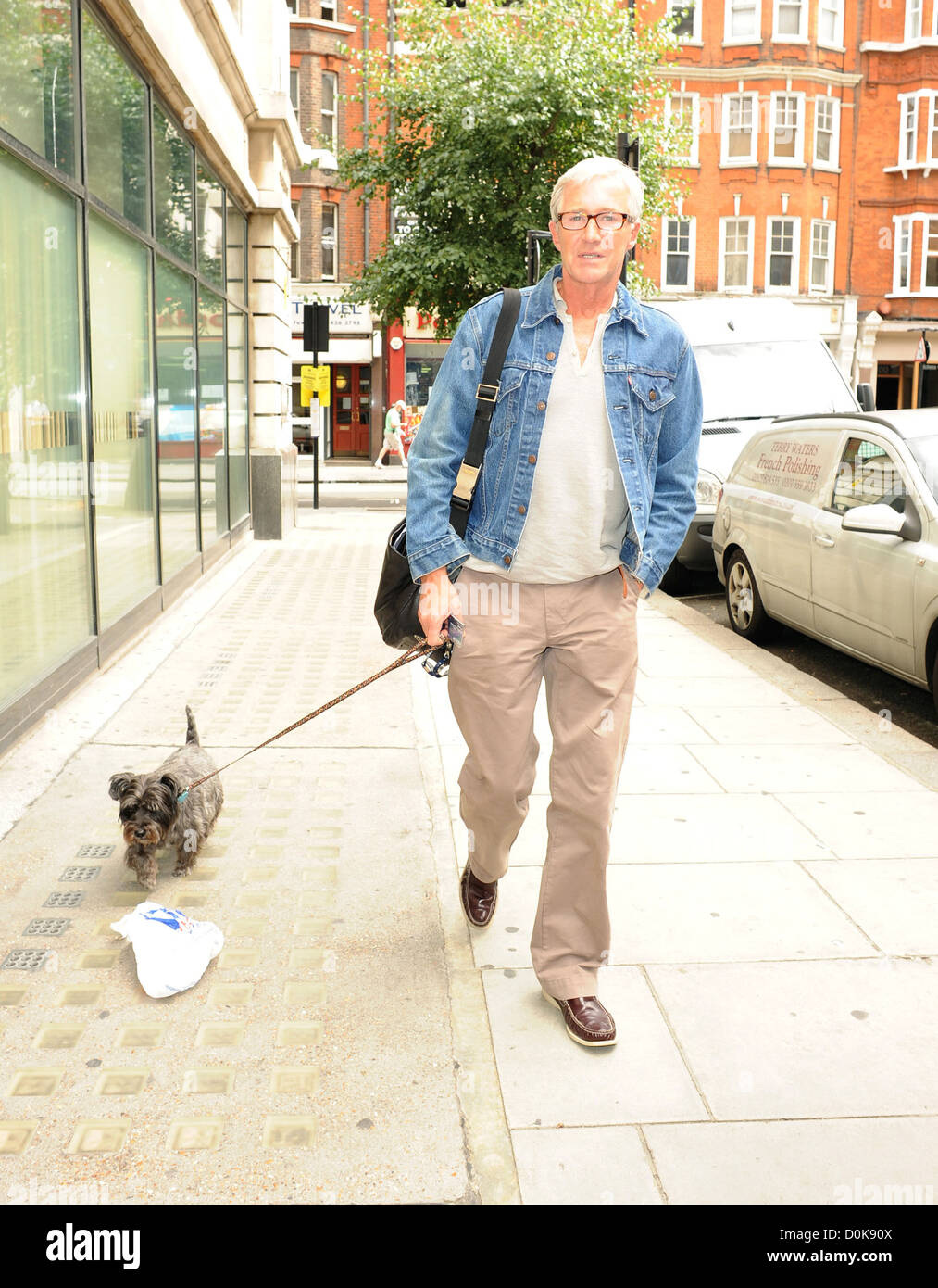 Paul O'Grady with his dog Olga outside the BBC Radio One studios London ...