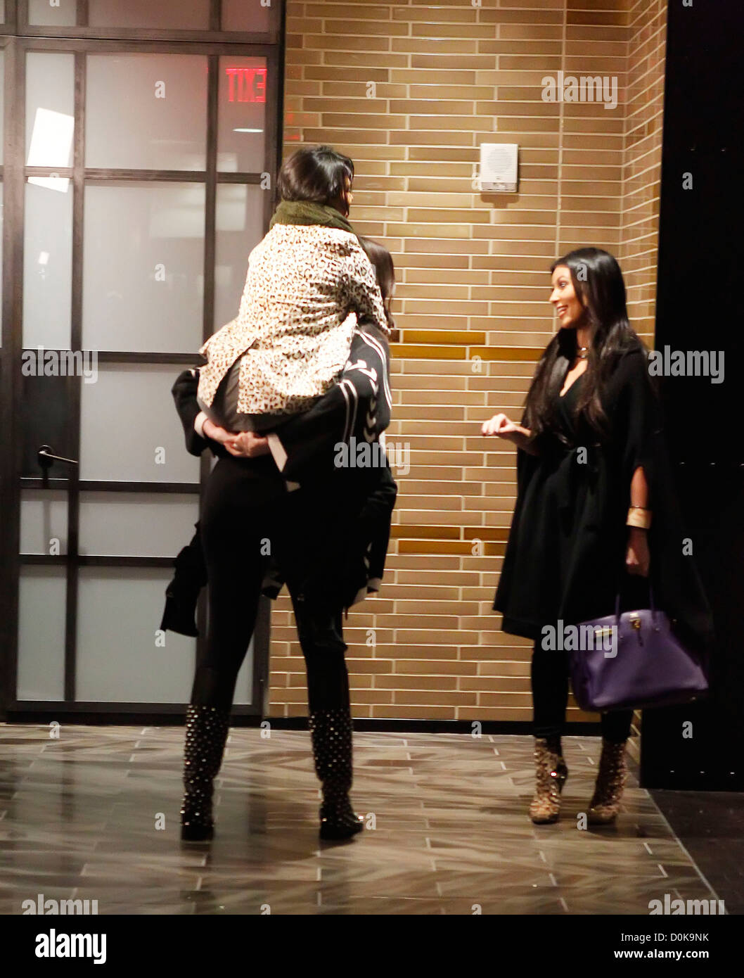 Khloe Kardashian offers her sister Kourtney Kardashian a piggy back ... Khloe Kardashian offers her sister Kourtney Kardashian a piggy back ...