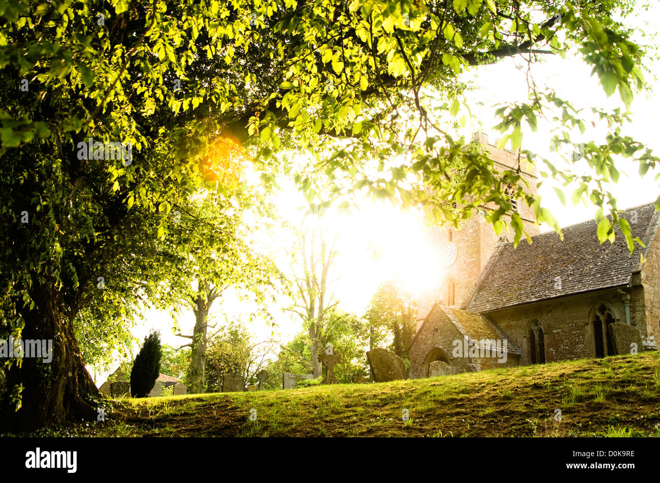 A Cotswold church in evening sunlight Stock Photo - Alamy