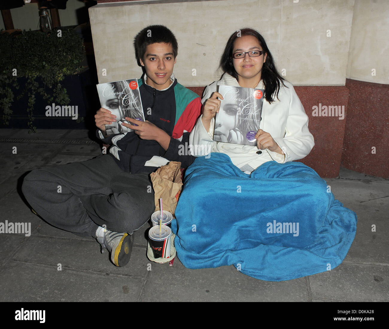 Dedicated fans queue around the block outside Waterstones bookshop in ...
