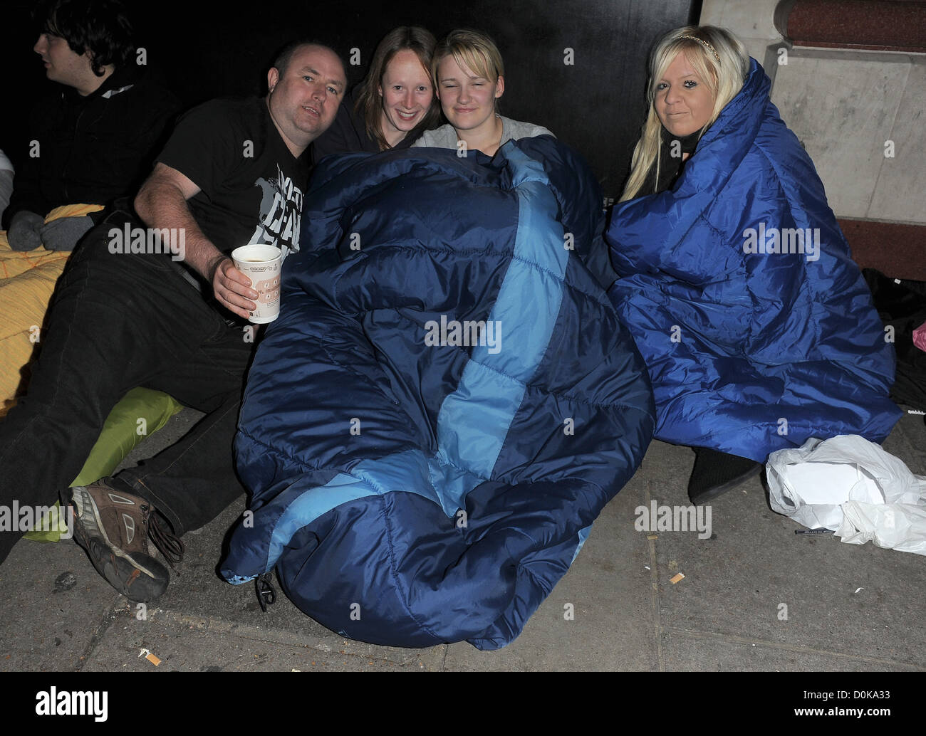 Dedicated fans queue around the block outside Waterstones bookshop in ...