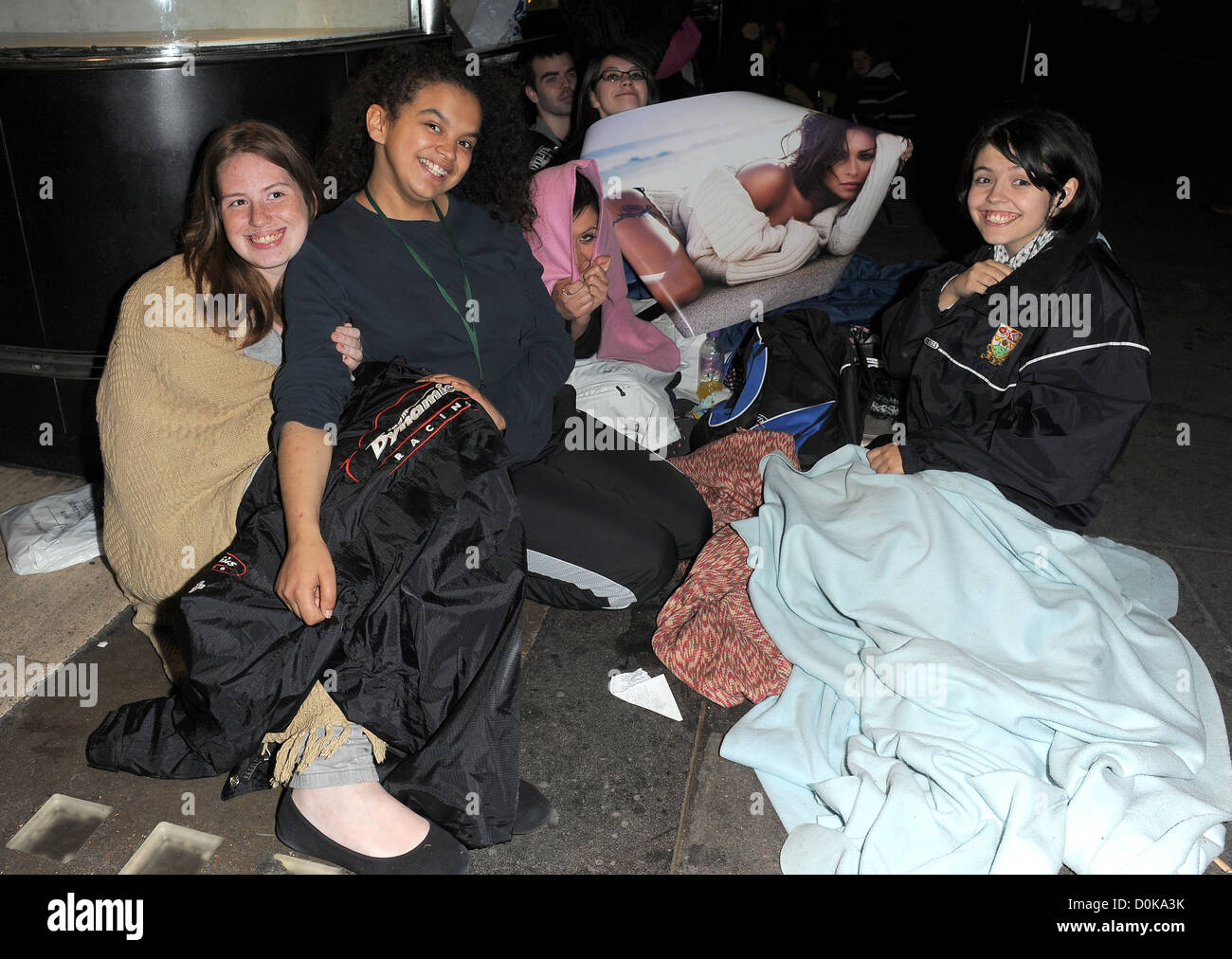 Dedicated fans queue around the block outside Waterstones bookshop in ...
