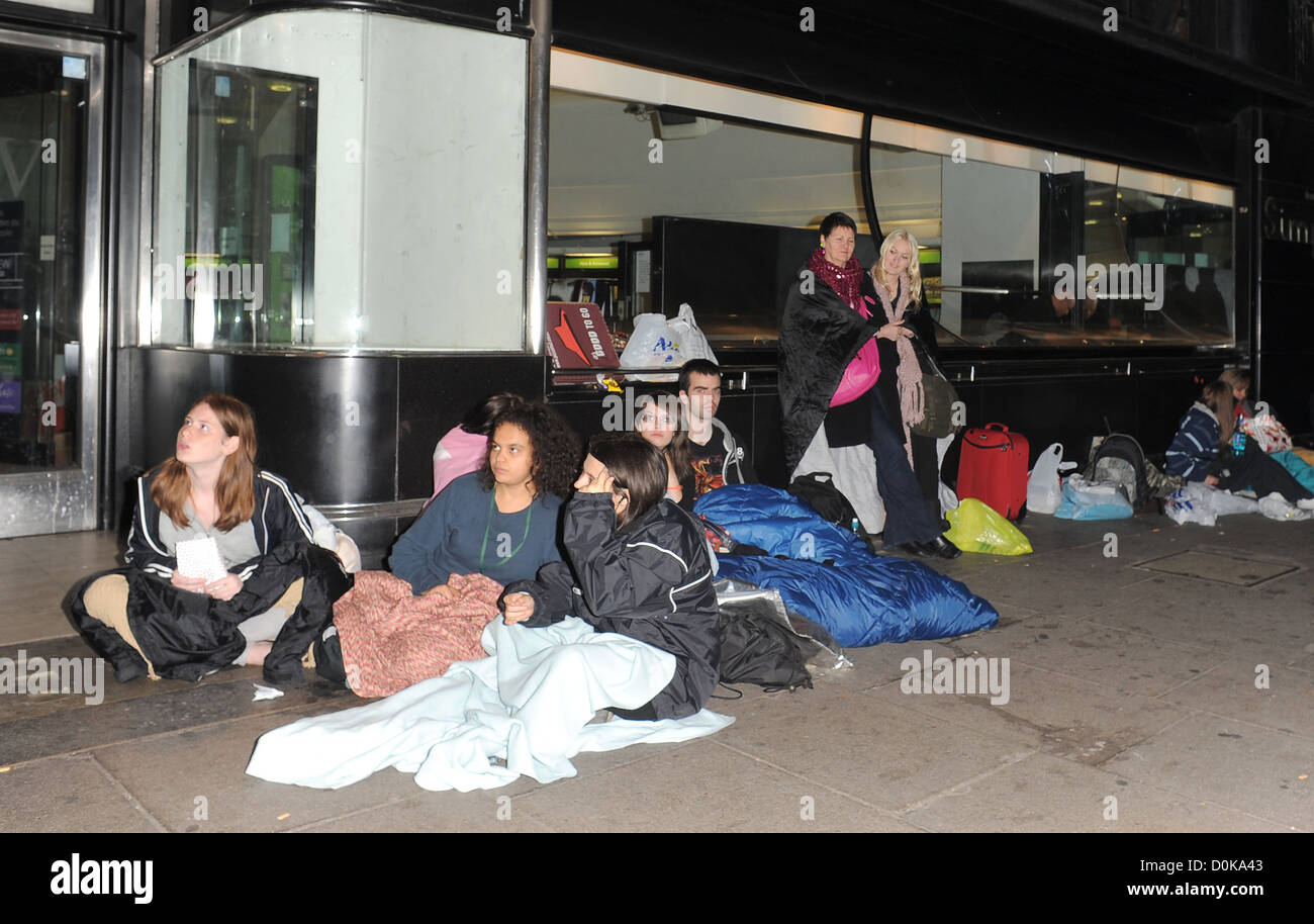 Dedicated fans queue around the block outside Waterstones bookshop in ...