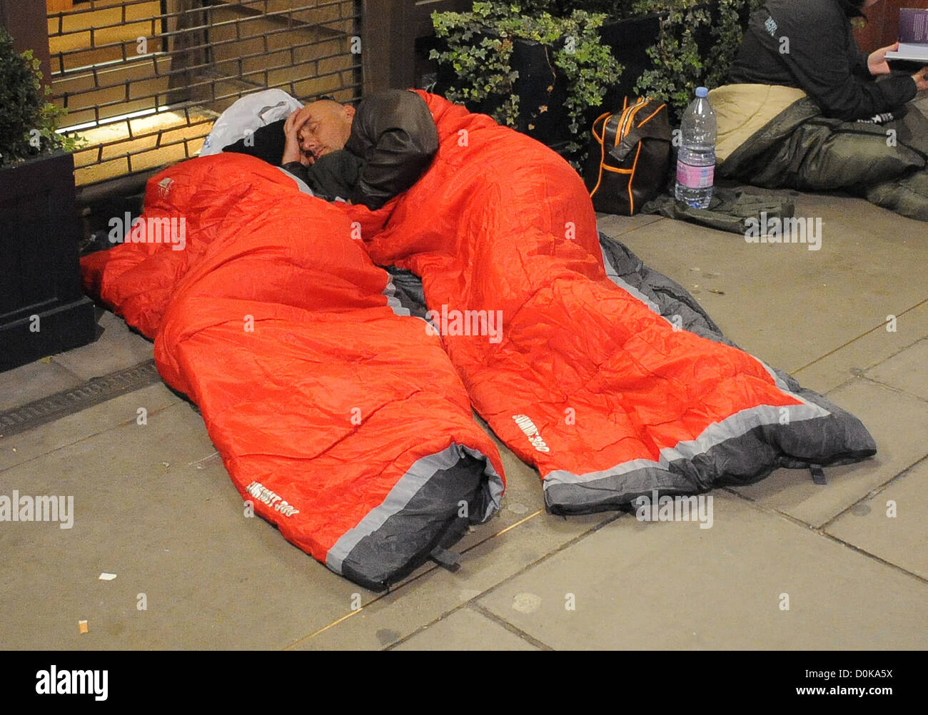 Dedicated fans queue around the block outside Waterstones bookshop in ...