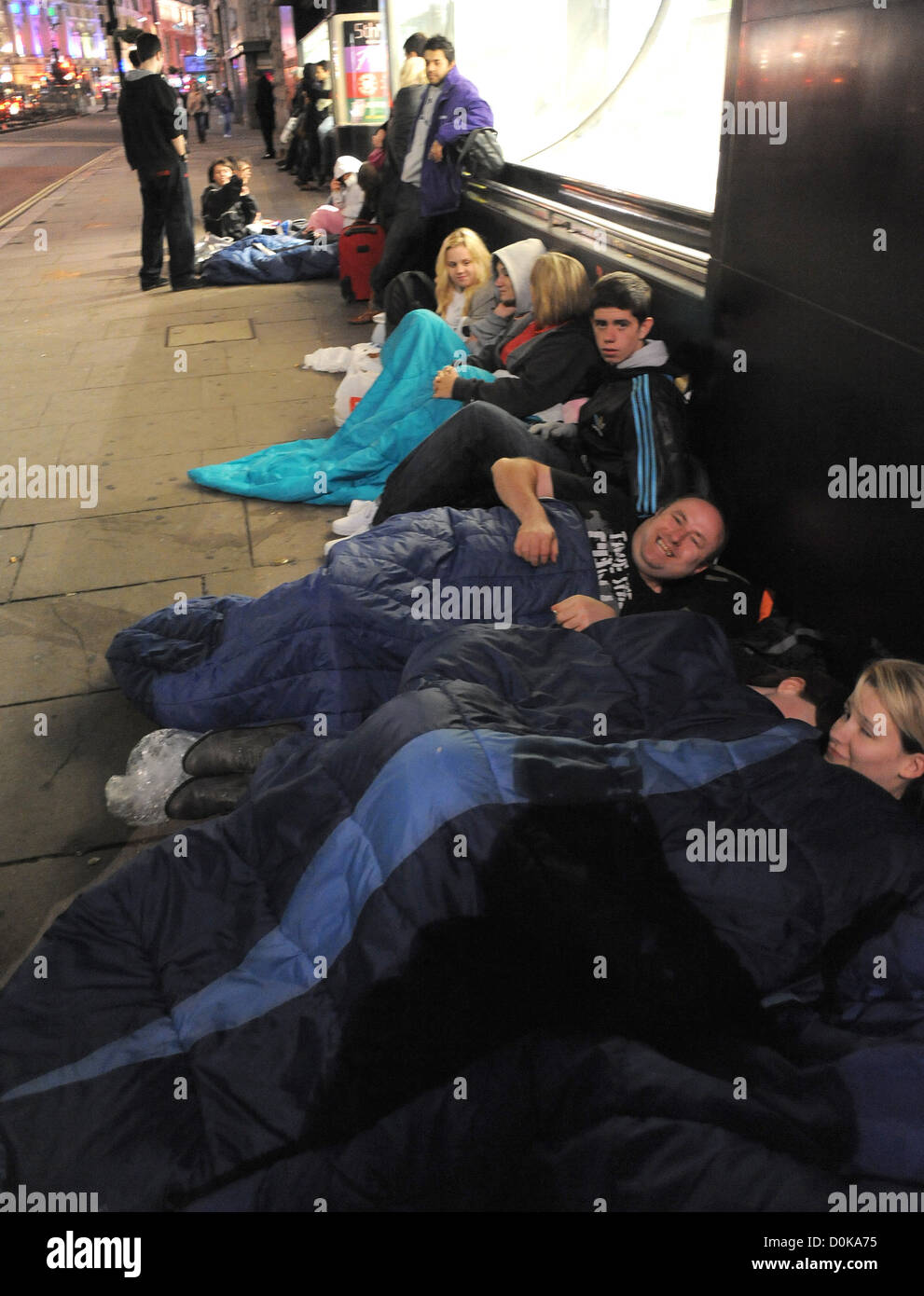 Dedicated fans queue around the block outside Waterstones bookshop in ...