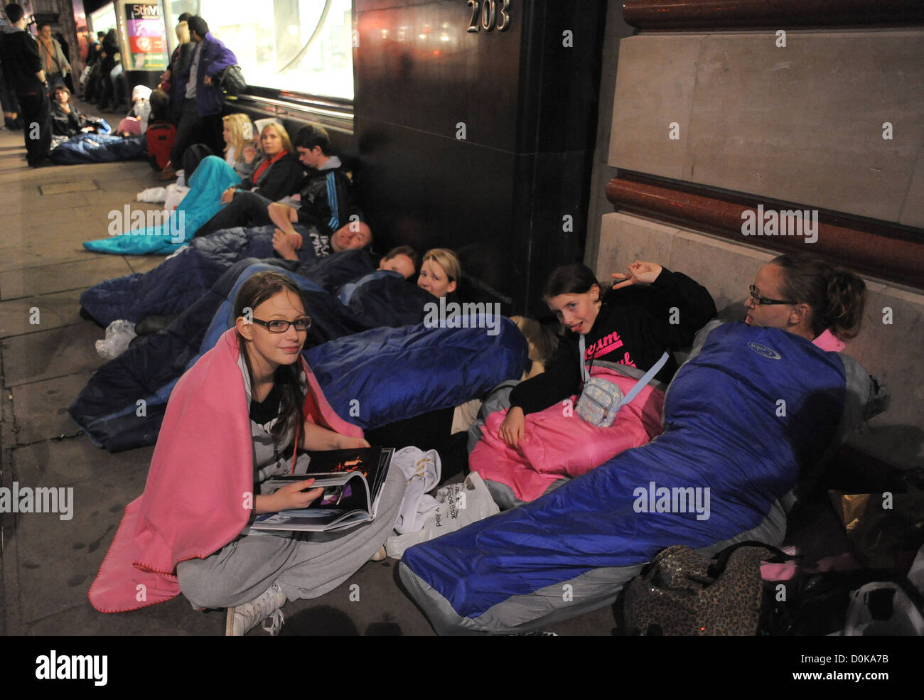 Dedicated fans queue around the block outside Waterstones bookshop in ...
