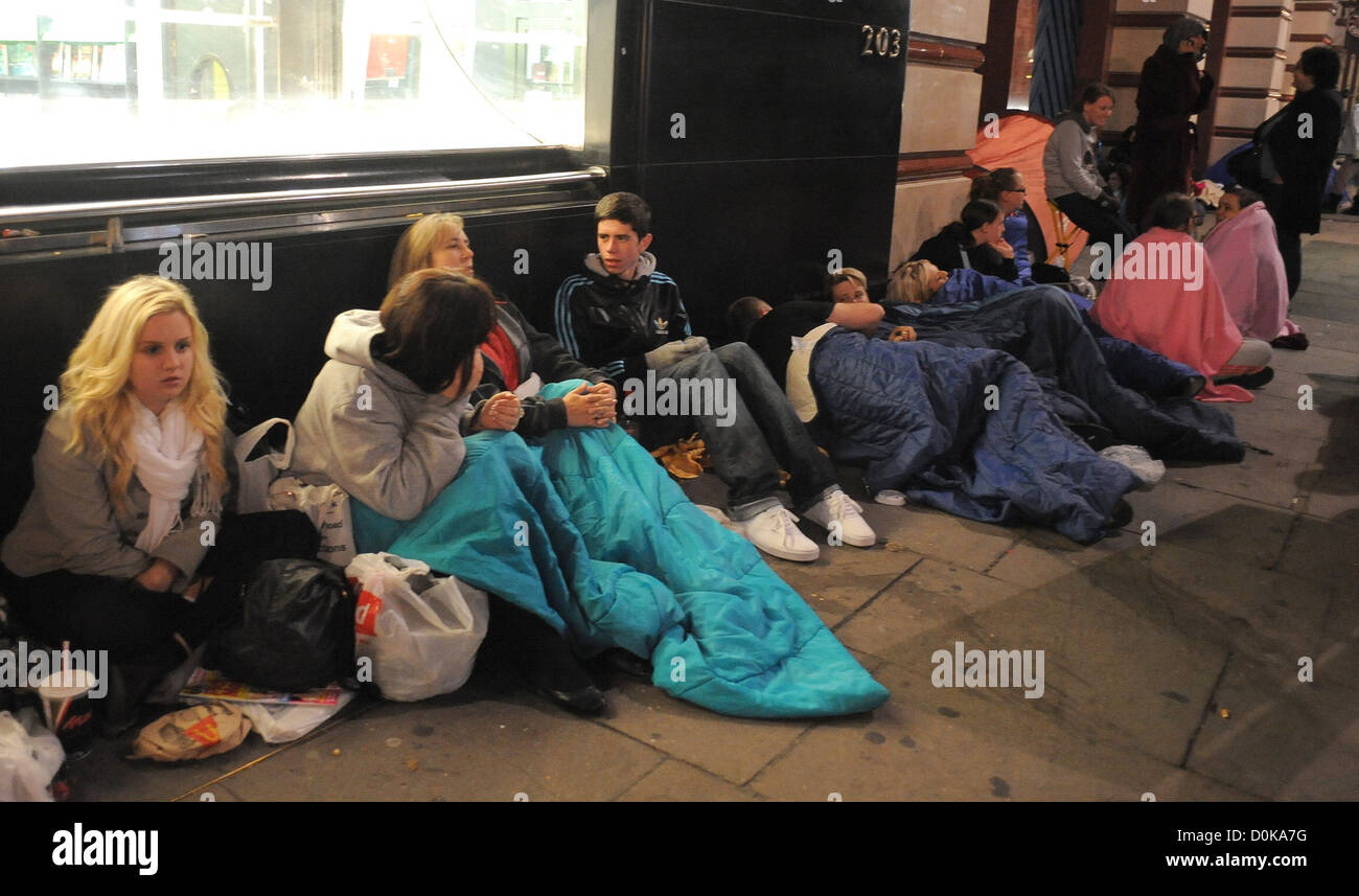 Dedicated fans queue around the block outside Waterstones bookshop in ...